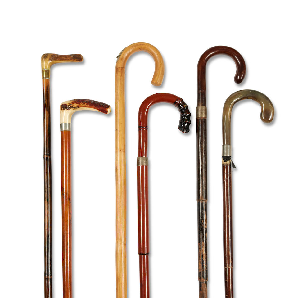 A collection of nine late 19th and 20th century walking canes and ...