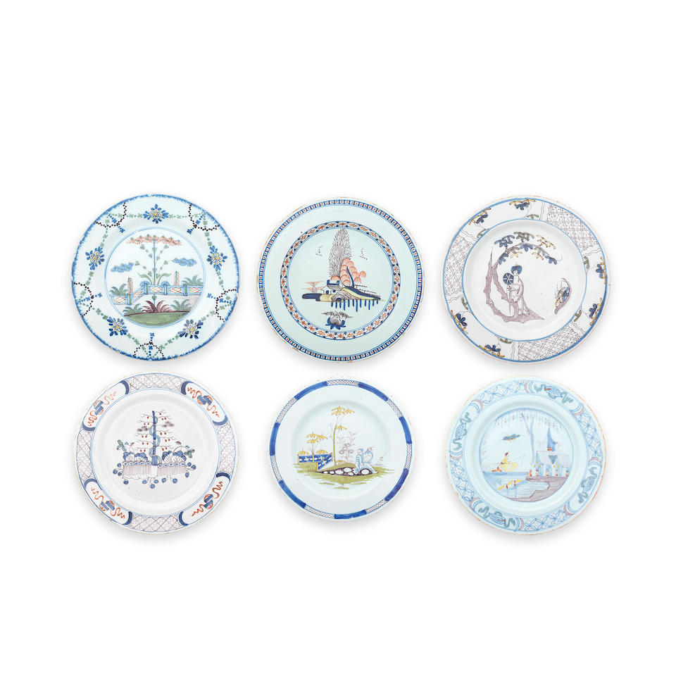 Six English delftware plates, circa 1750-80 Painted in polychrome with ...