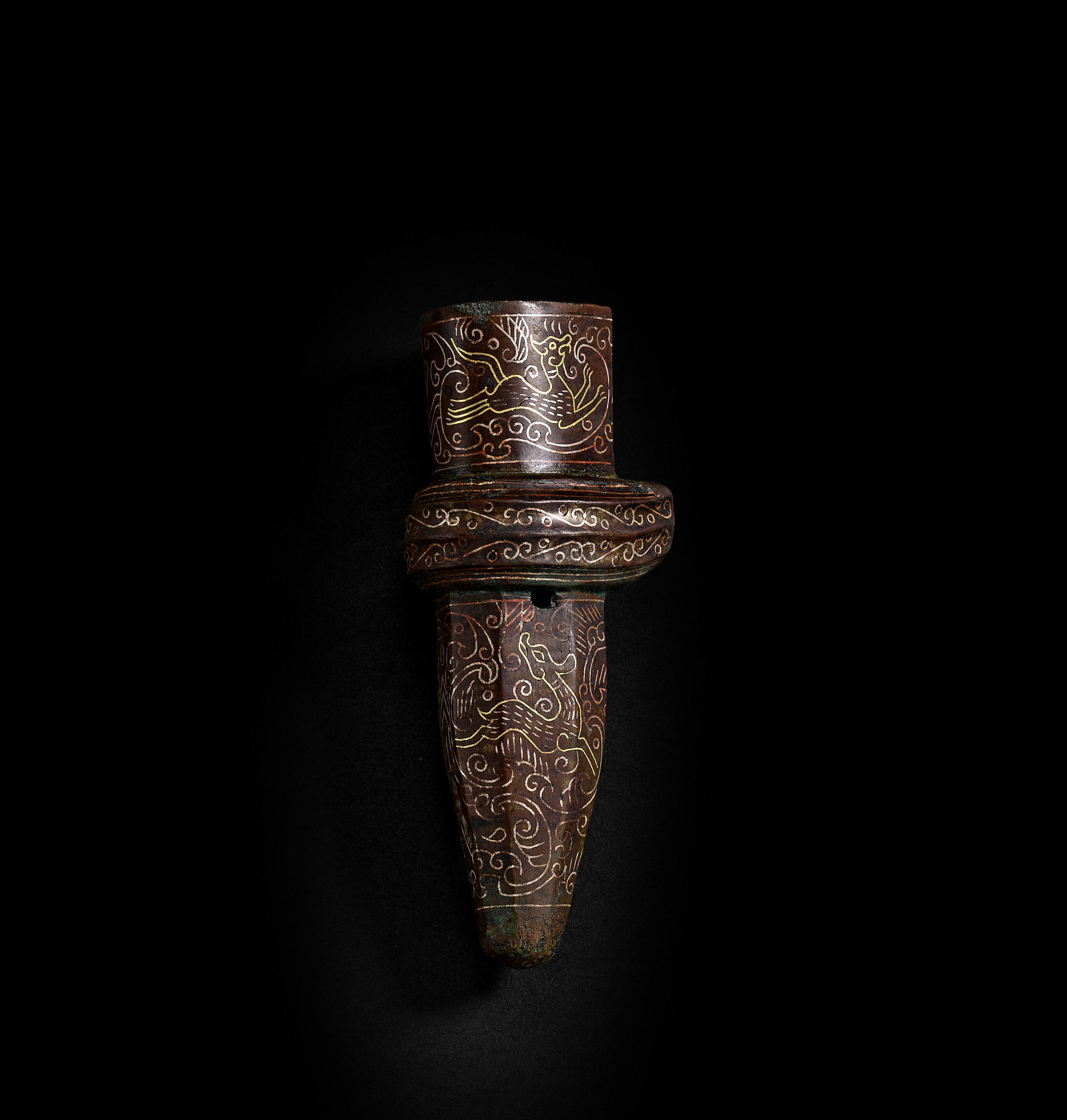 A GOLD AND SILVER-INLAID BRONZE 'MYTHICAL BEASTS' FITTING Warring ...