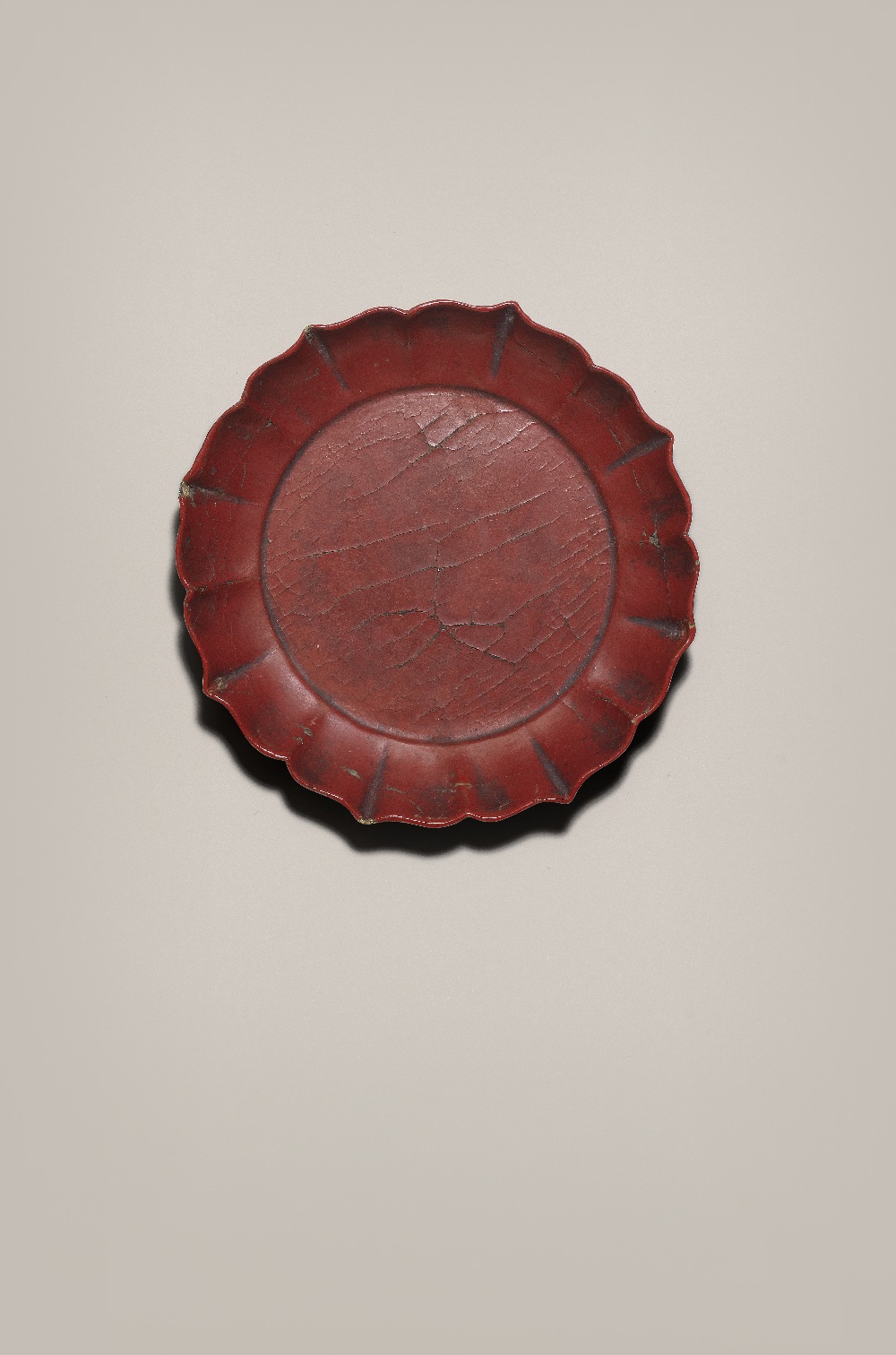 A RARE CINNABAR LACQUER FOLIATE-RIM DISHNanyang jianji four-character ...