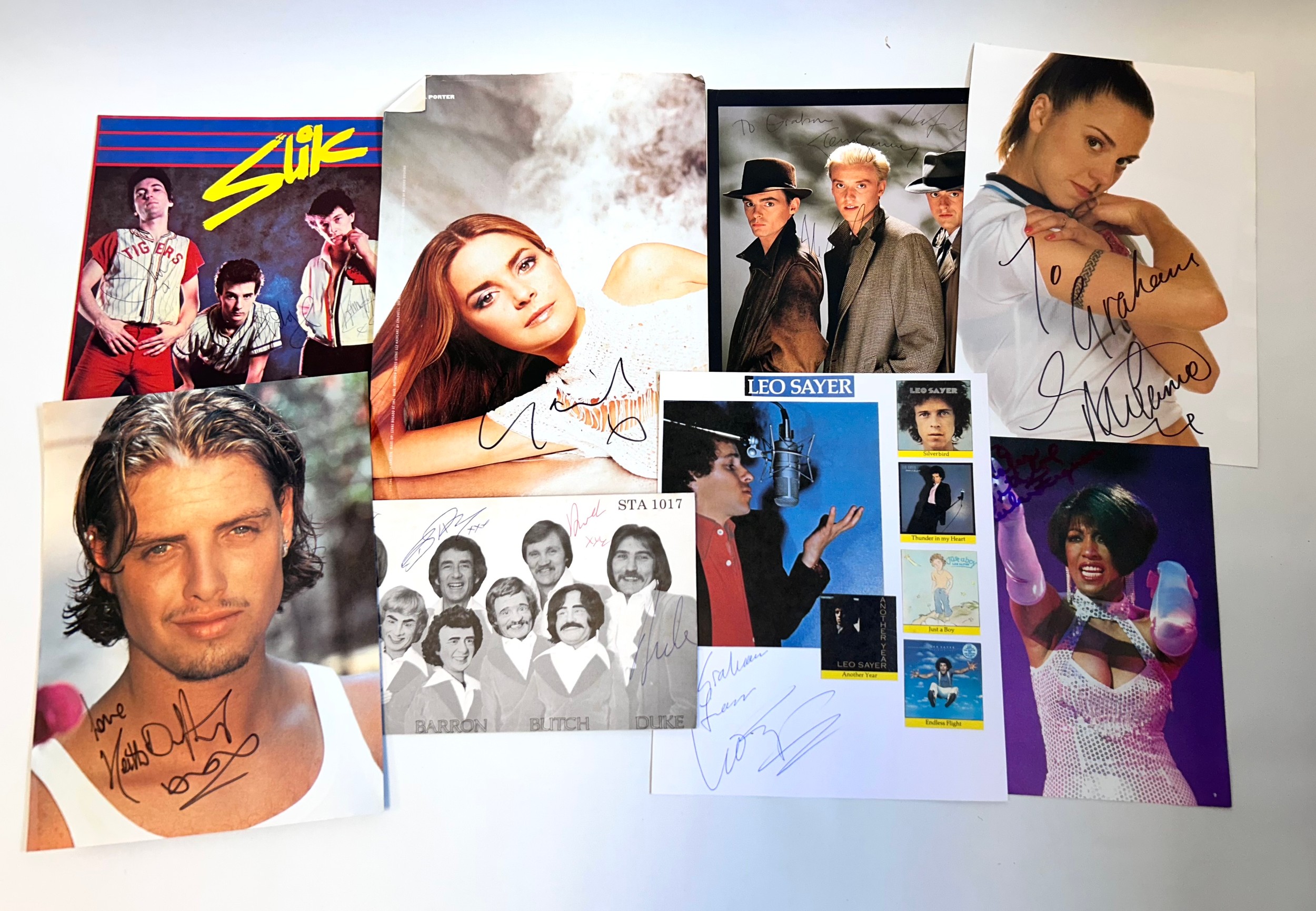 Selection of signed photographs of popular music artists