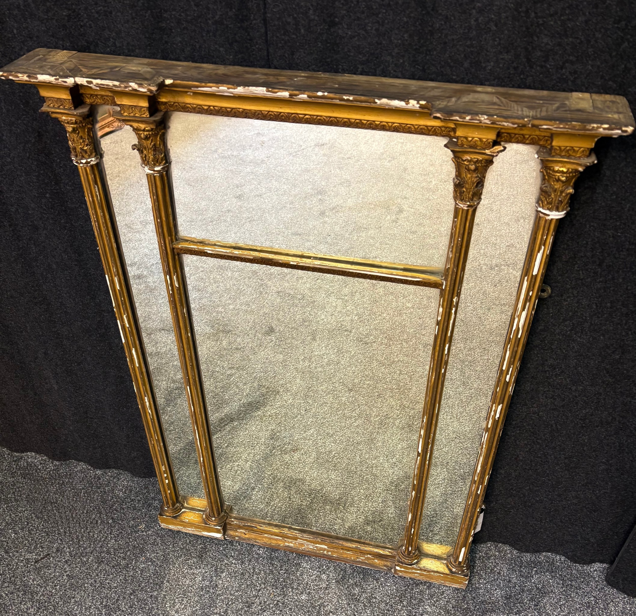A Regency gilt wood pier mirror, detailed with Corinthian column design ...
