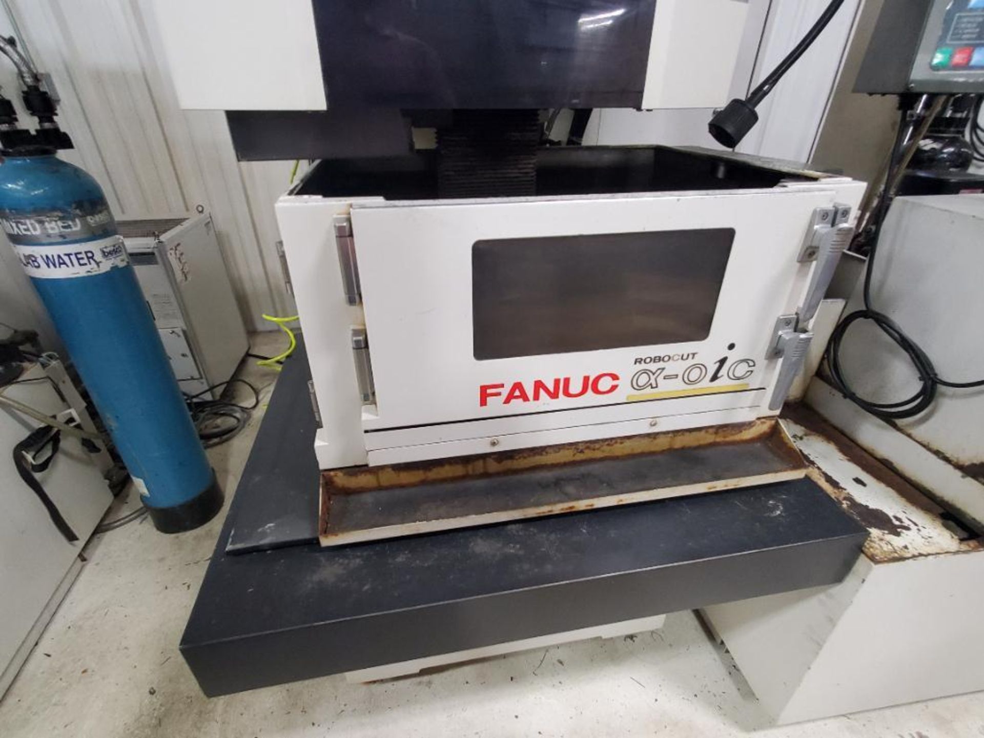 Fanuc RoboCut EDM. Model Alpha OiC. Mfg Date 02/2004. Serial ...