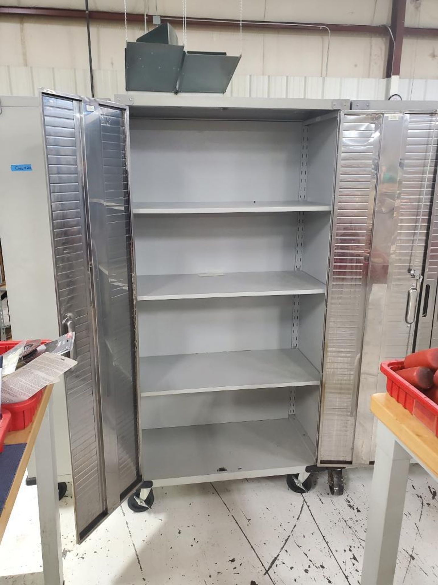 Rolling Cabinet. 36in wide x 18in deep x 72in tall.