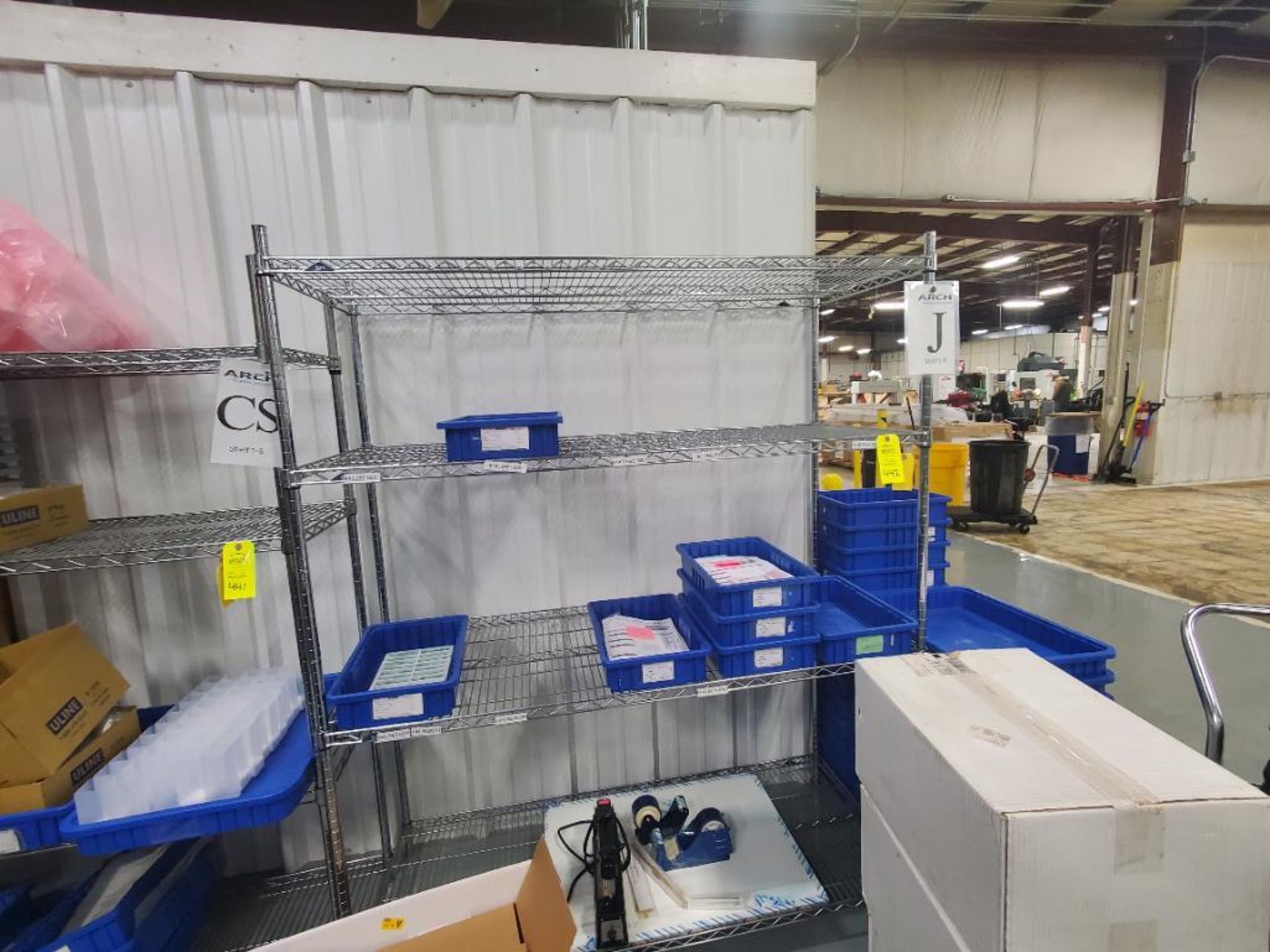 Metro style rack. 60in wide x 24in deep x 72in tall. (Contents not ...