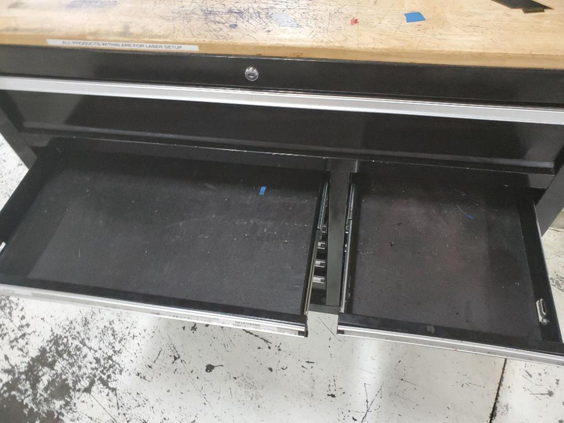 11 drawer Roll around tool box. 41in wide. Wood top.