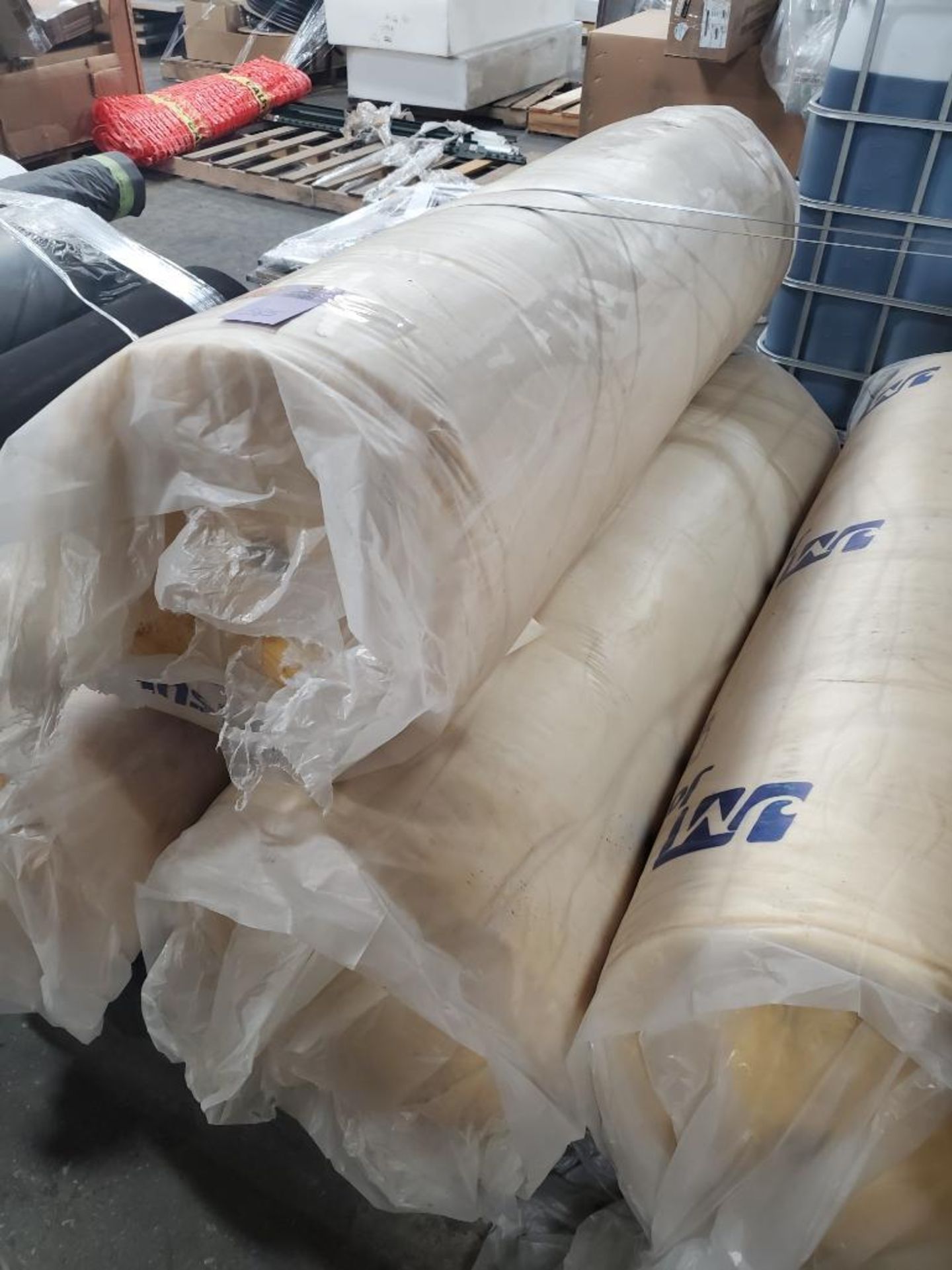Qty 4 - Large rolls of insulation.