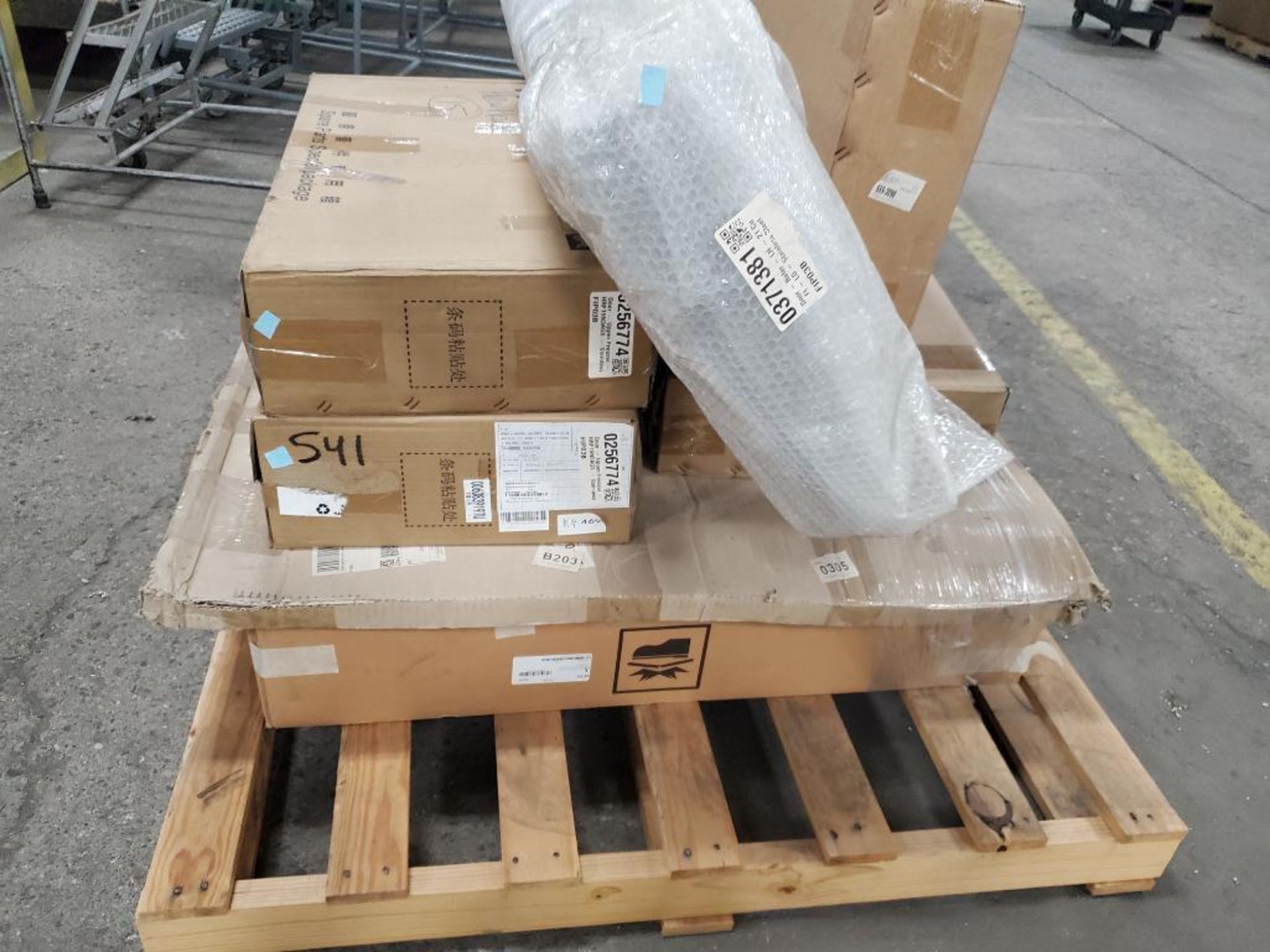 Pallet assorted replacement parts.