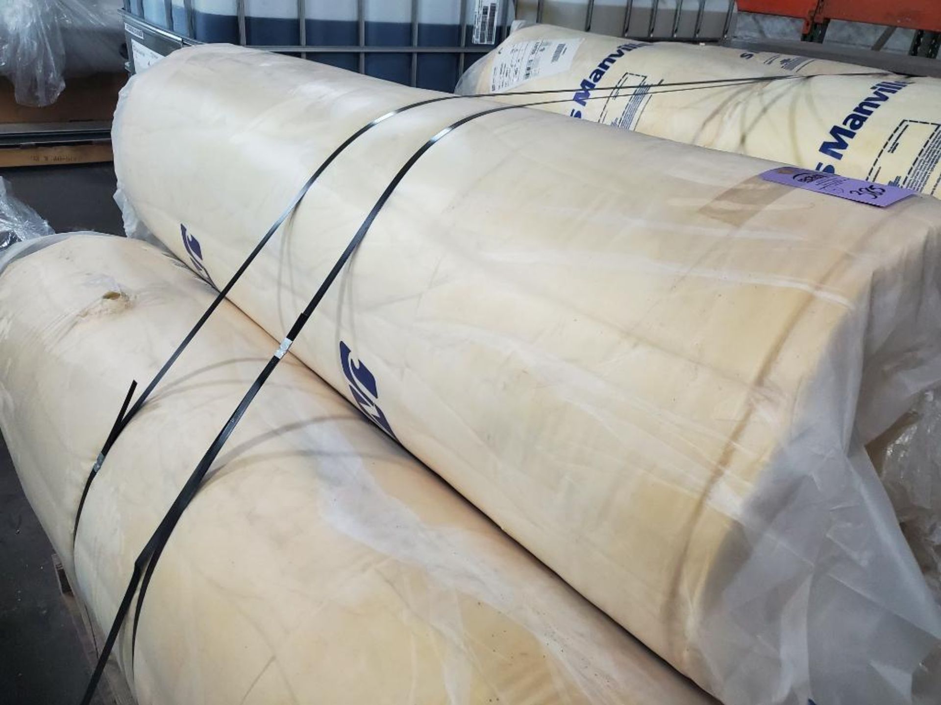 Qty 4 - Large rolls of insulation.