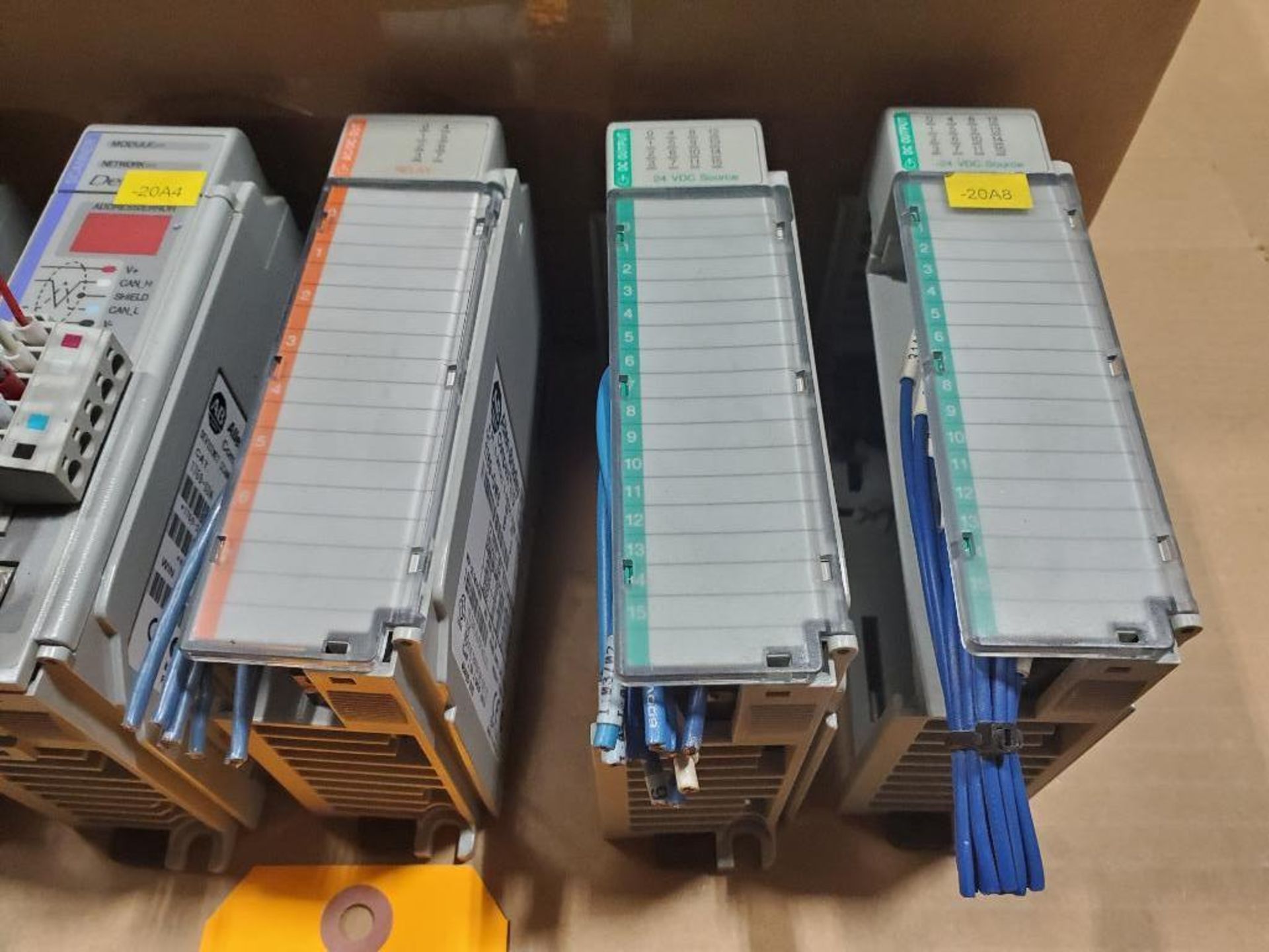Assorted Allen Bradley 1769 series PLC controls.