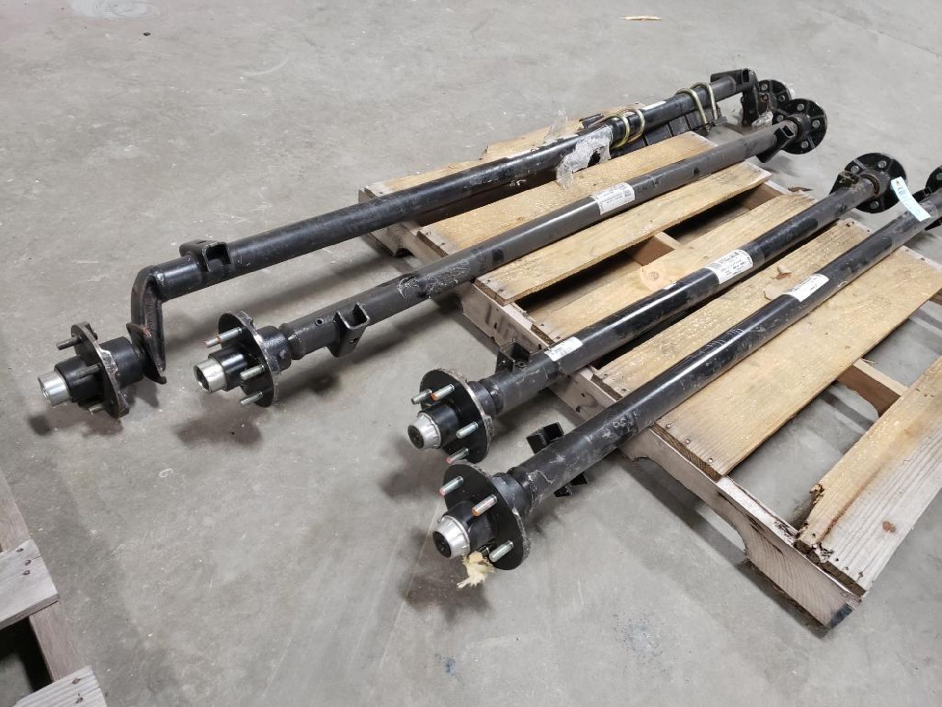 Qty 4 - Assorted axles. For a $60 fee this lot can be prepared for ...