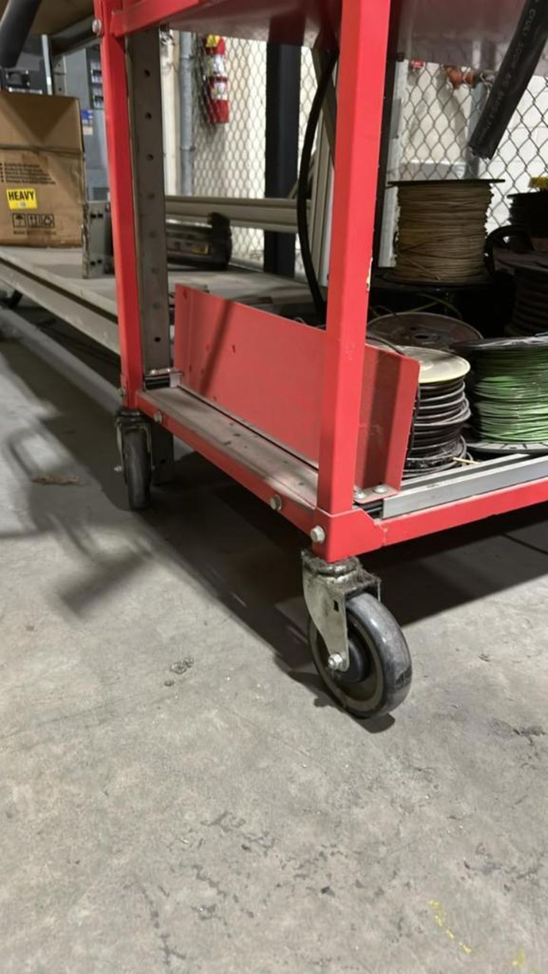 3-Shelve Wire and Cable Storage Cart with Assorted Cables.