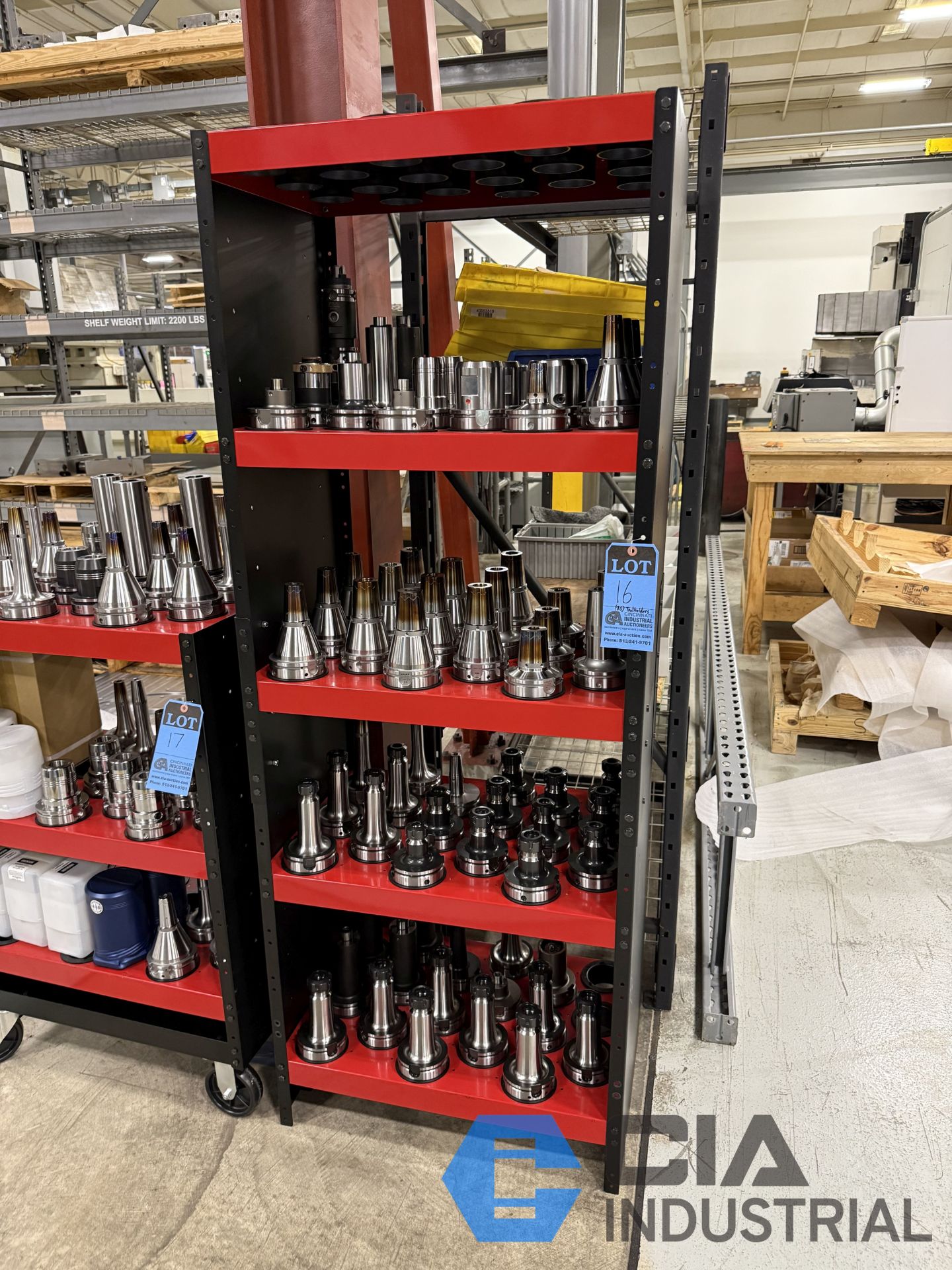 { Group of lots: 15, 16, 17, 18, 19 } HSK 100 TOOLHOLDERS W/ RACK