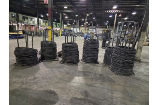 (13) STACKS STEEL REBAR COIL STOCK - (18) RACKS - For convenience, the ...