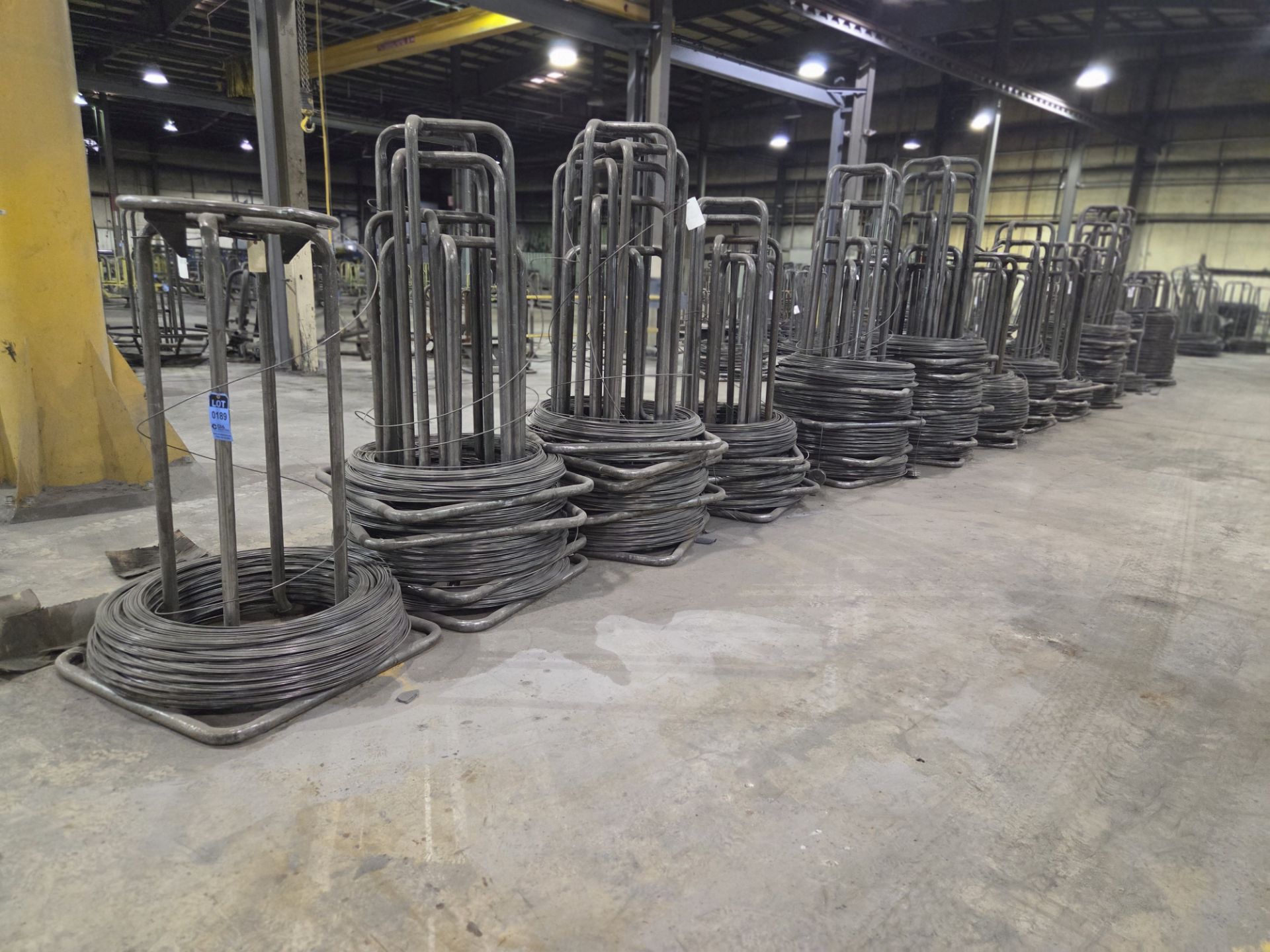 (13) STACKS STEEL REBAR COIL STOCK - (42) RACKS - For convenience, the ...