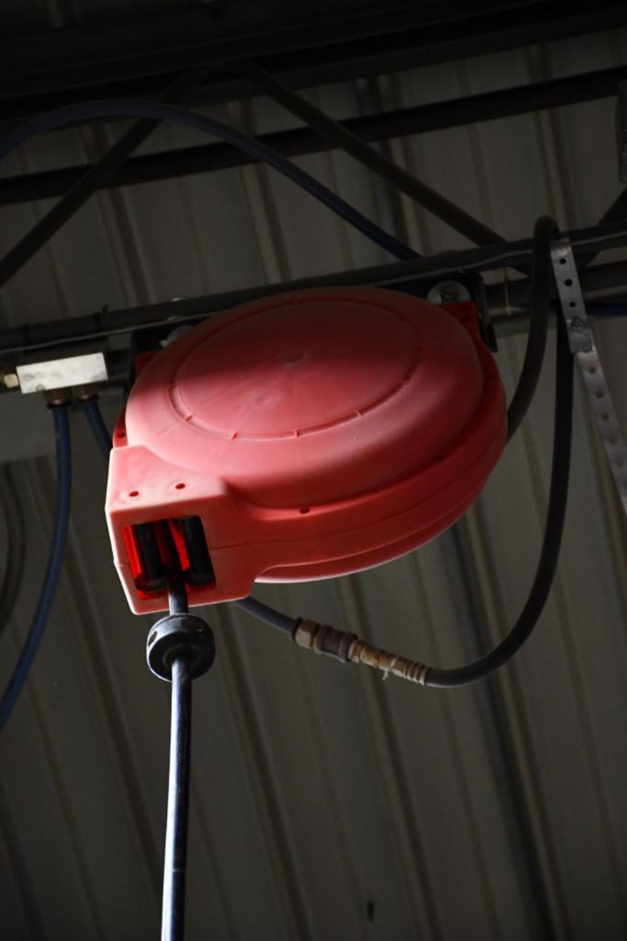 RETRACTABLE AIR HOSE REEL, MOUNTED ON CEILING BEAM, LADDER AND TOOLS ...