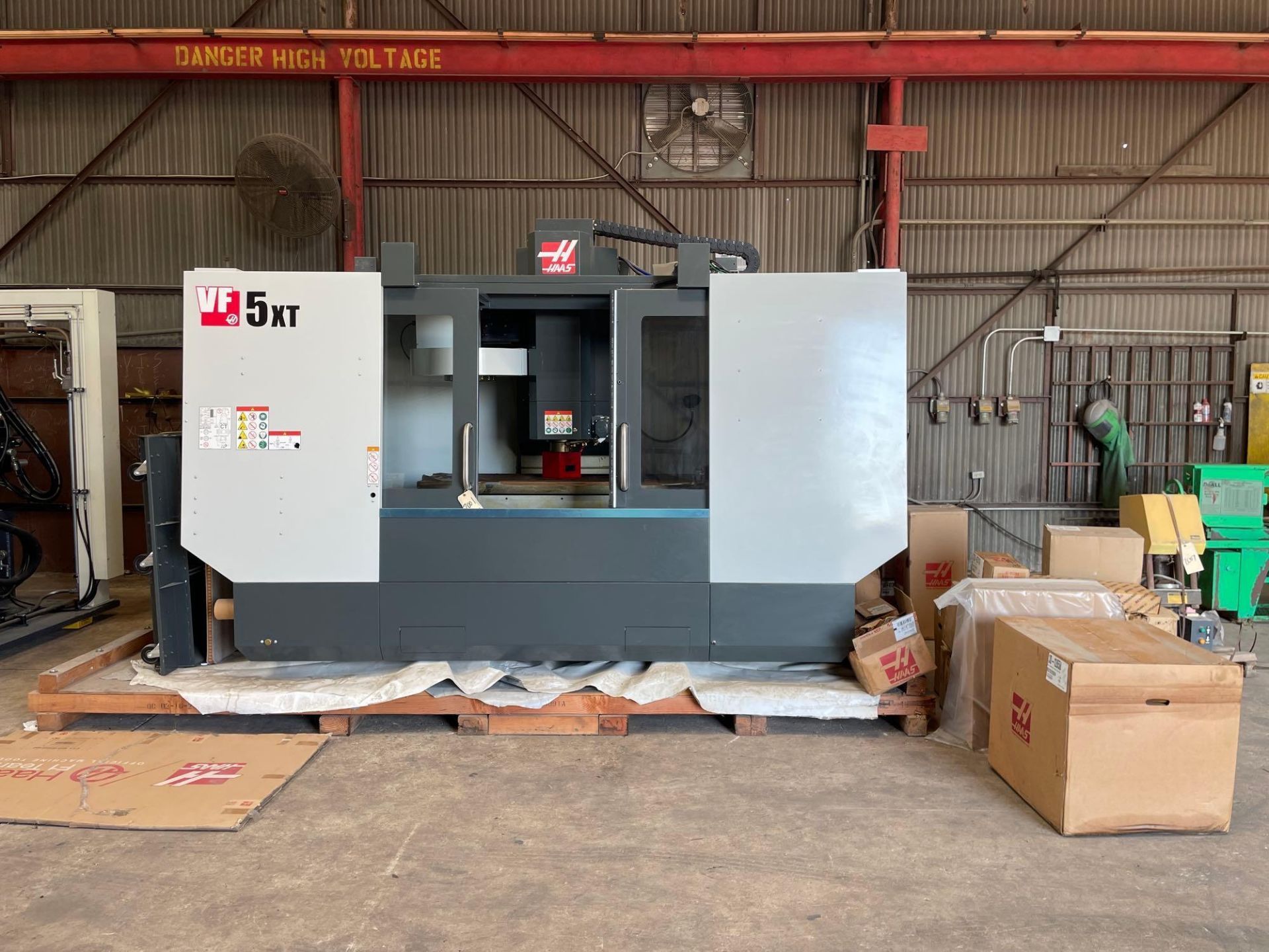 HAAS VF-5 / 40 XT VERTICAL MACHINING CENTER, 60 X 26 X 25" TRAVELS, CTS, WIPS, AUTO DOOR, PCOOL,