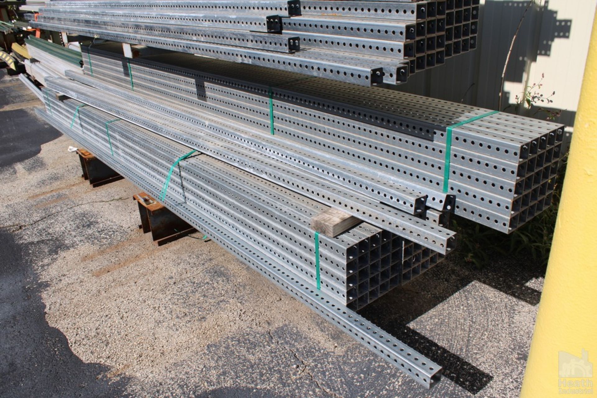 LARGE QTY PERFORATED STEEL SQUARE TUBING 10' TO 12' AND 1.5" TO 2"