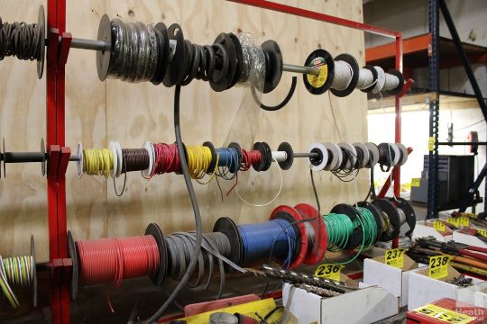 WIRE STORAGE RACK WITH ASSORTED ELECTRICAL AND AUTOMOTIVE WIRE