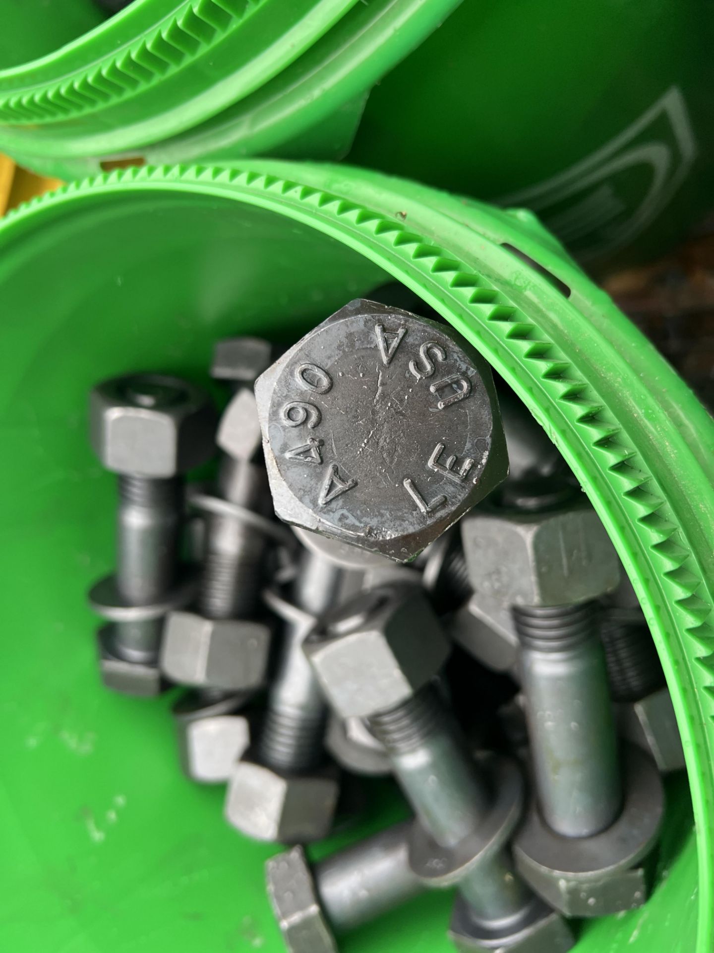 LOT OF APPROX. (48) 12"DIA X 22"H BUCKETS OF STRUCTURAL STEEL BOLTS ...