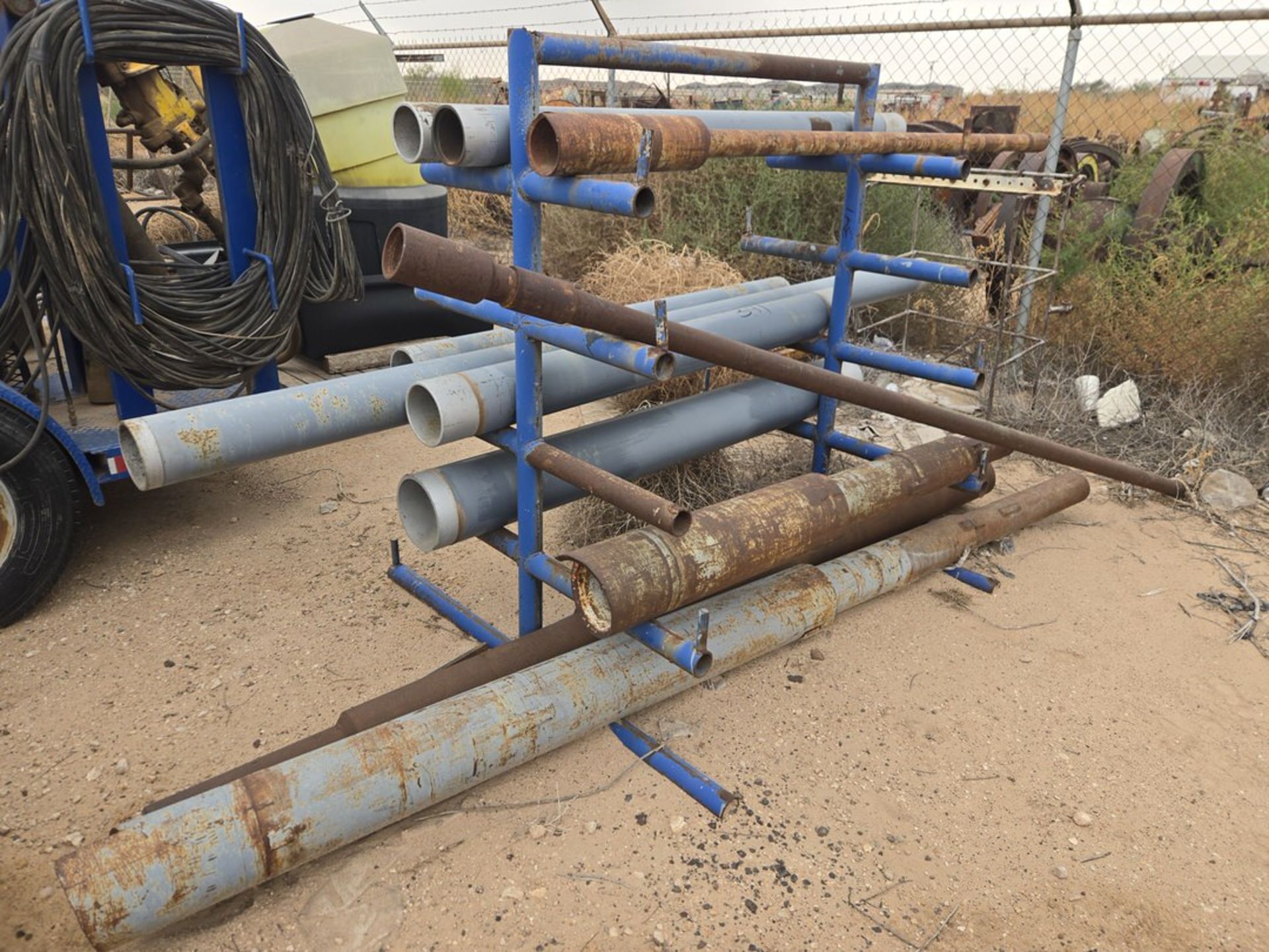 Pipe Rack w/ Mixed Fishing Equipment