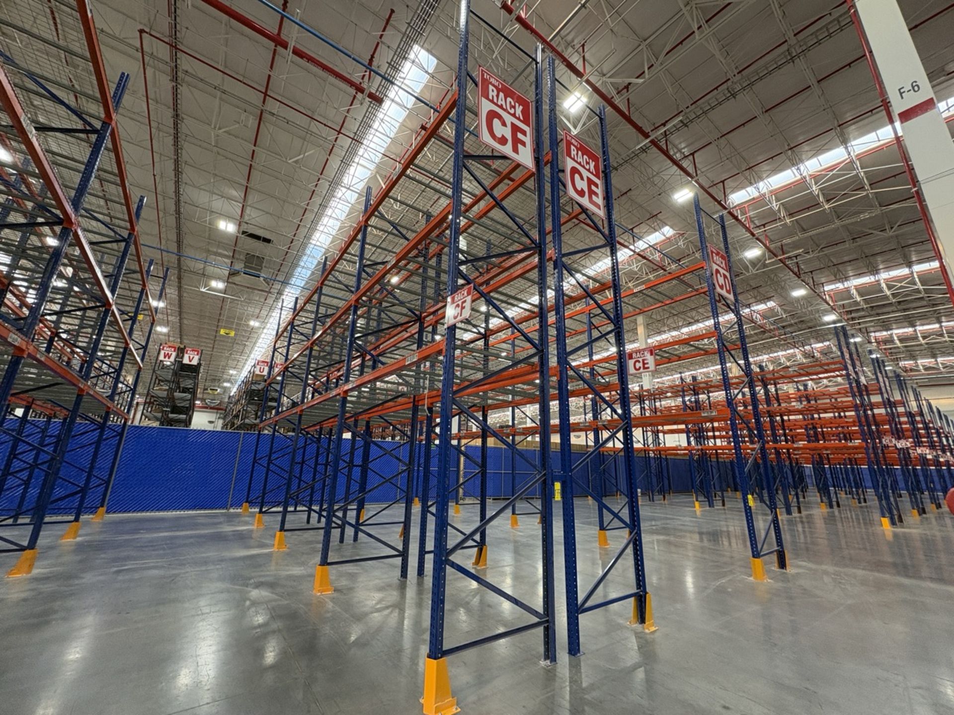 2 rows of storage racks measuring 11 meters long, 6 meters high, and 1. ...