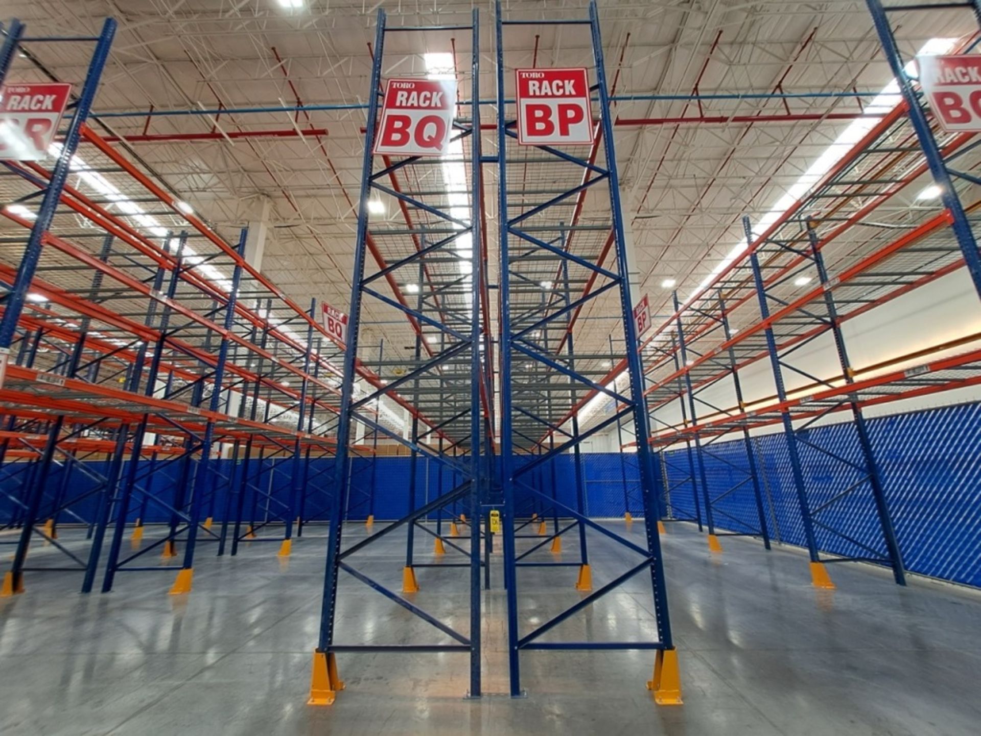 2 rows of storage racks measuring 11 meters long, 6 meters high, and 1. ...