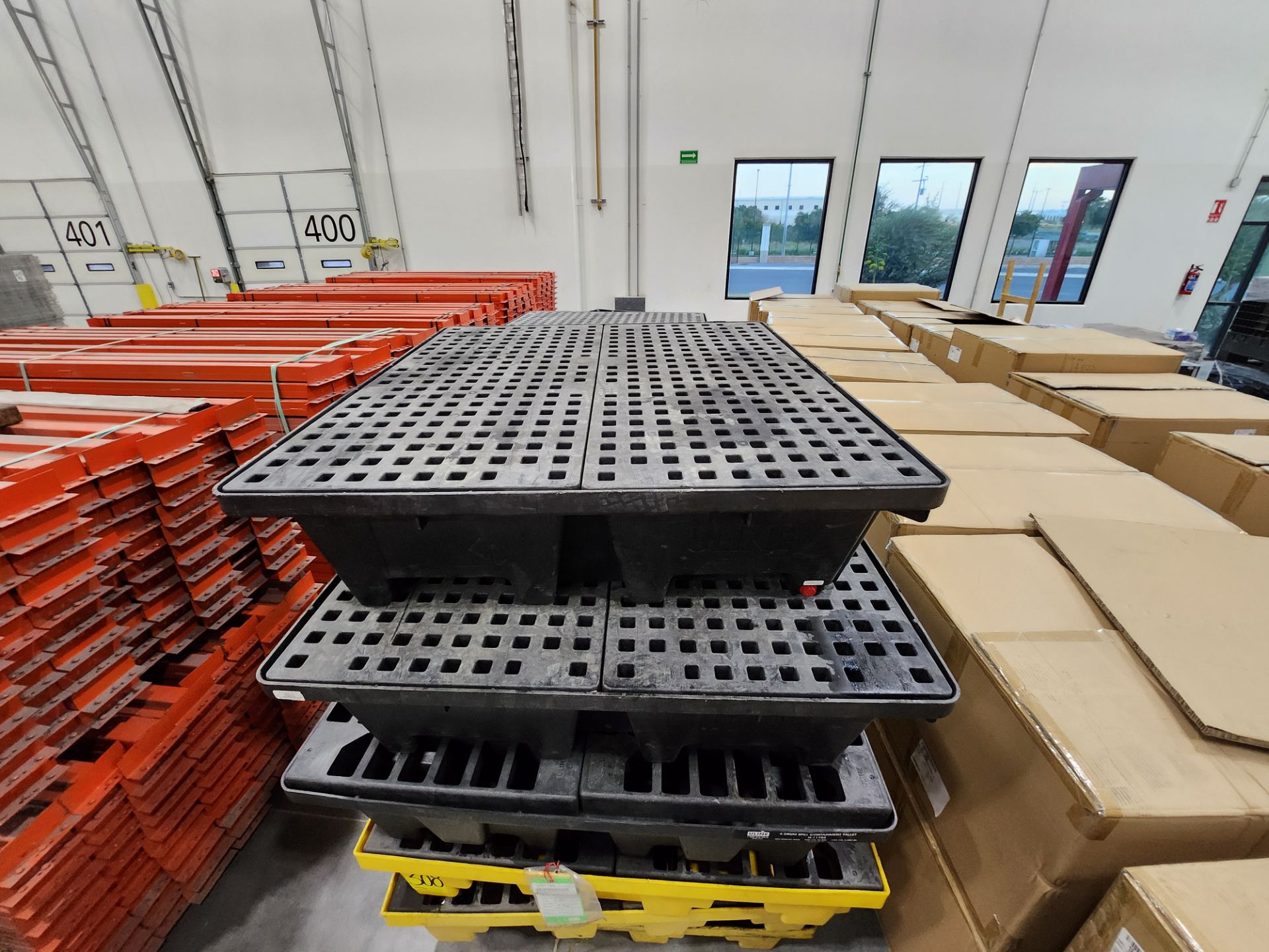 Lot of 16 ULINE spill containment pallets, with approximate dimensions ...