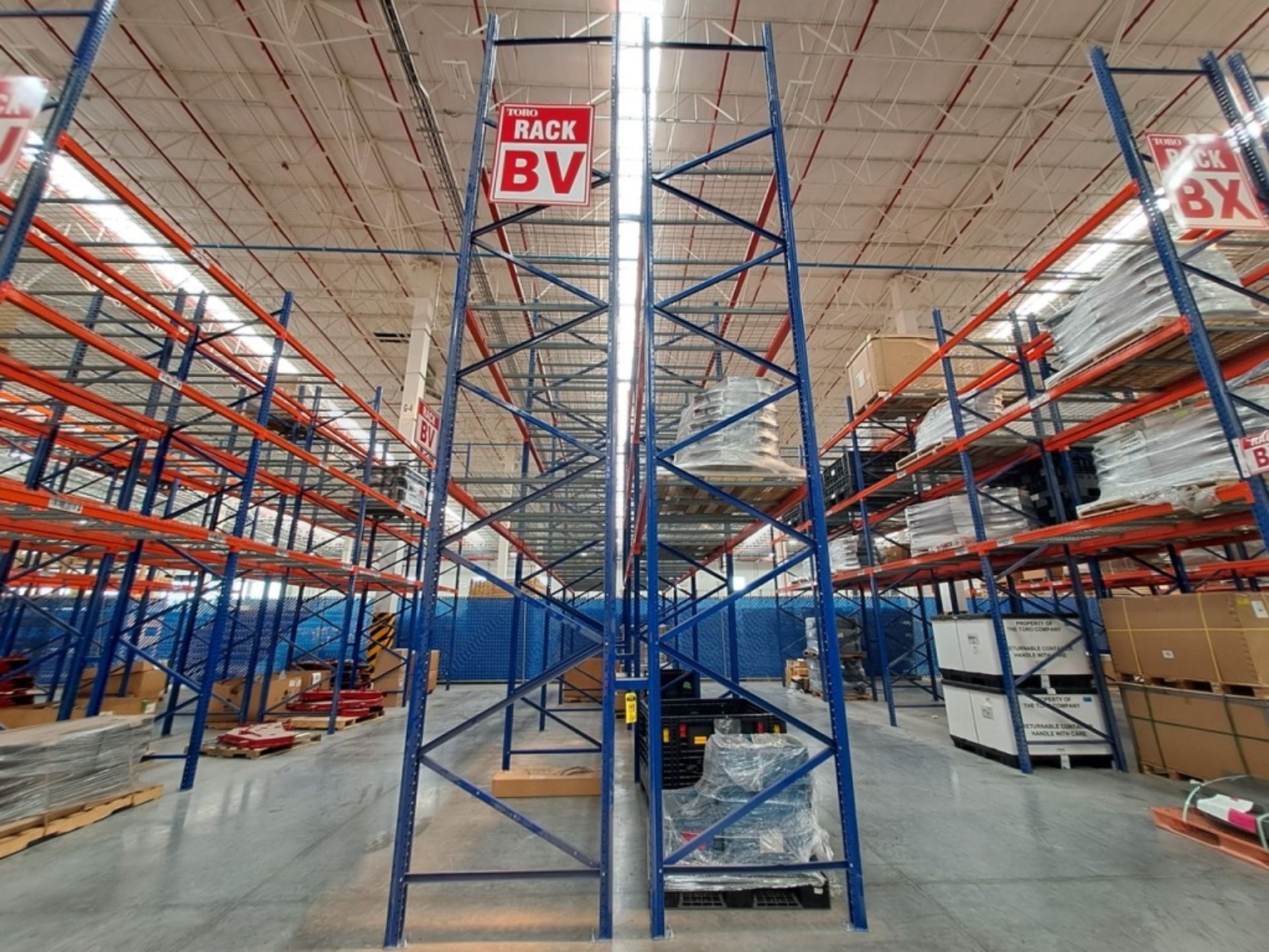 2 rows of storage racks measuring 11 meters long, 6 meters high, and 1. ...