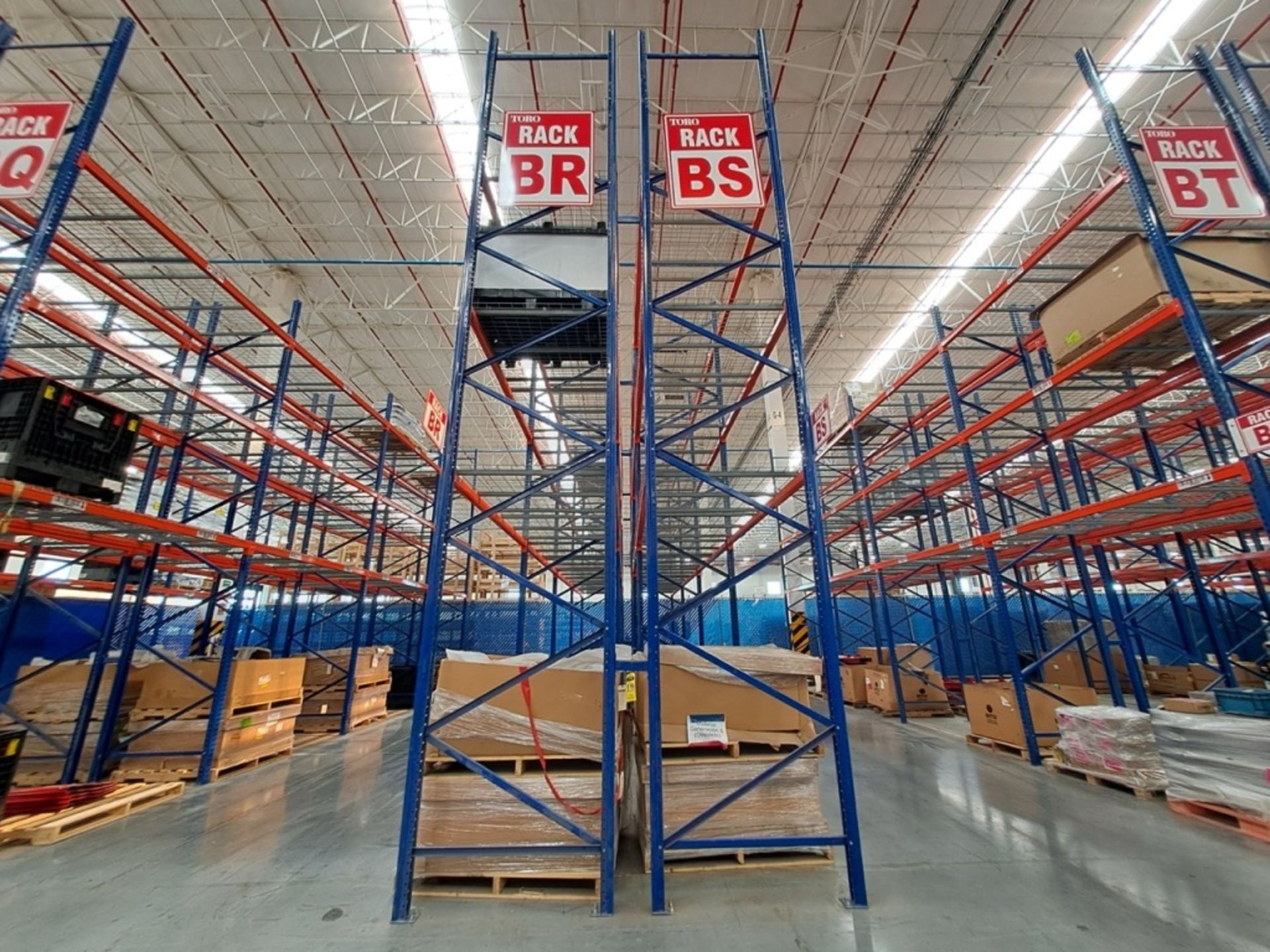 2 rows of storage racks measuring 11 meters long, 6 meters high, and 1. ...
