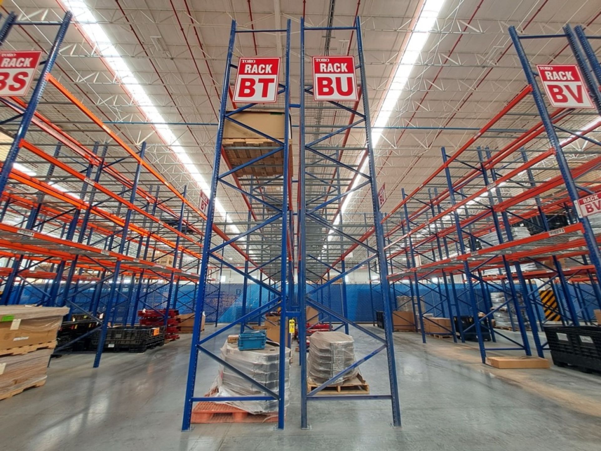 2 rows of storage racks measuring 11 meters long, 6 meters high, and 1. ...