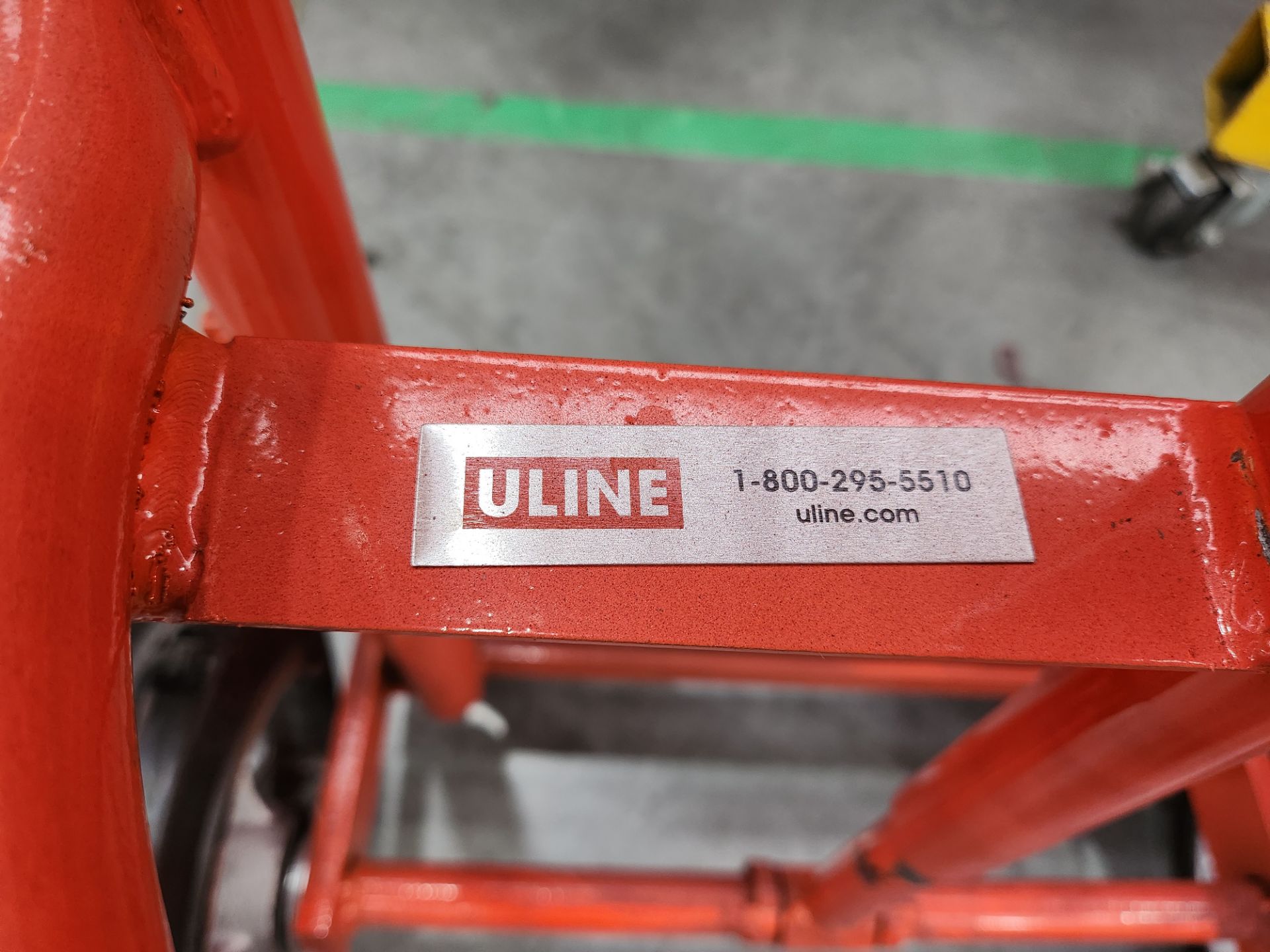 ULINE 2-ton hydraulic jack, adjustable; 1 ULINE Steel drum dolly with ...