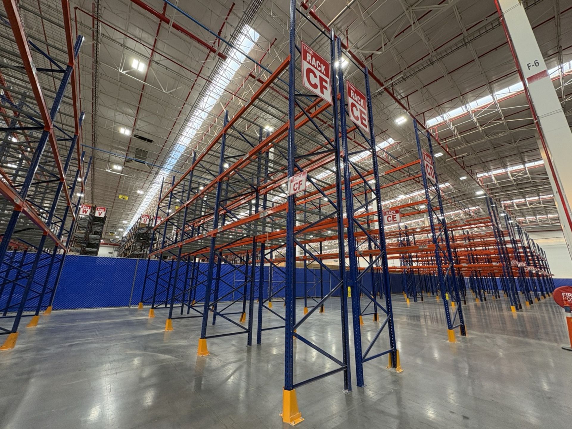2 rows of storage racks measuring 11 meters long, 6 meters high, and 1. ...