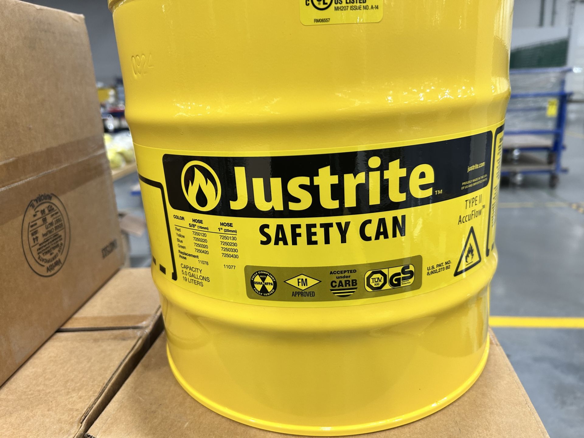 Pallet load, contains: 5 yellow JUSTRITE brand 5-gallon drums, 5 red ...