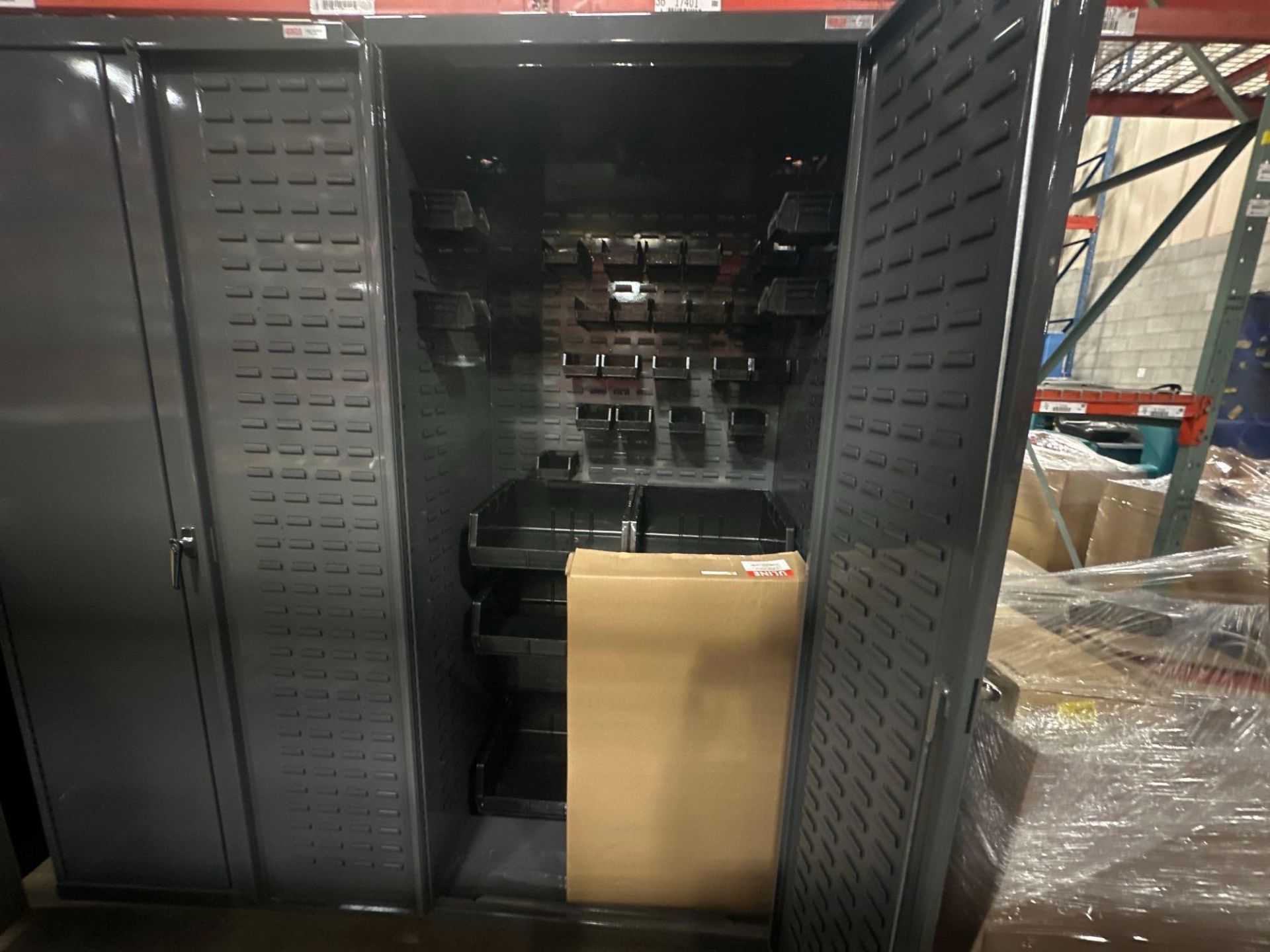Uline vertical storage cabinet, prefitted with bins for parts and tools ...