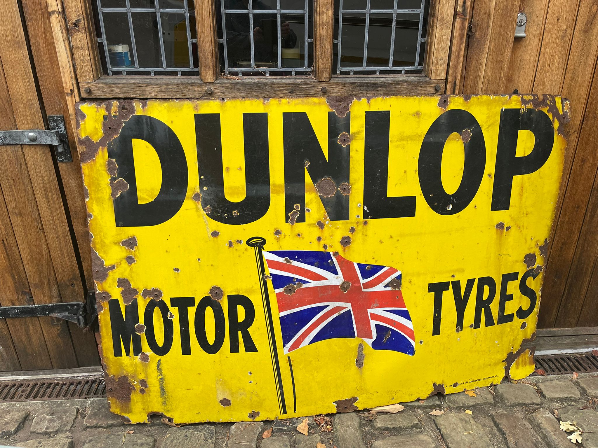 Dunlop Motor Tyres Union Flag single-sided enamel advertising sign