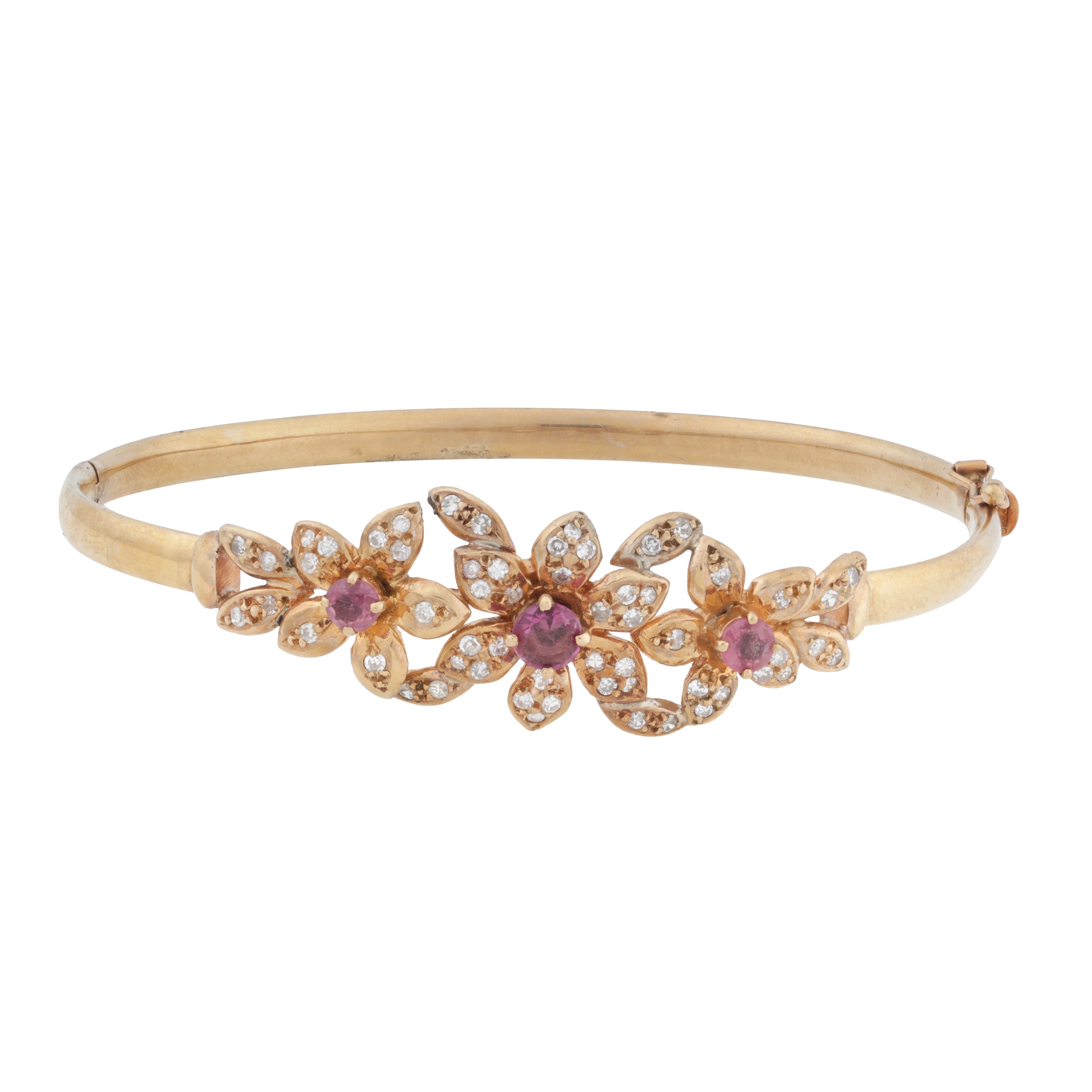 A ruby and diamond flower bangle Of hinge design, set to its front with ...