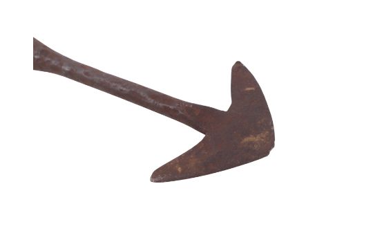 A 19th century cast iron whale harpoon head with large shaft socket and ...
