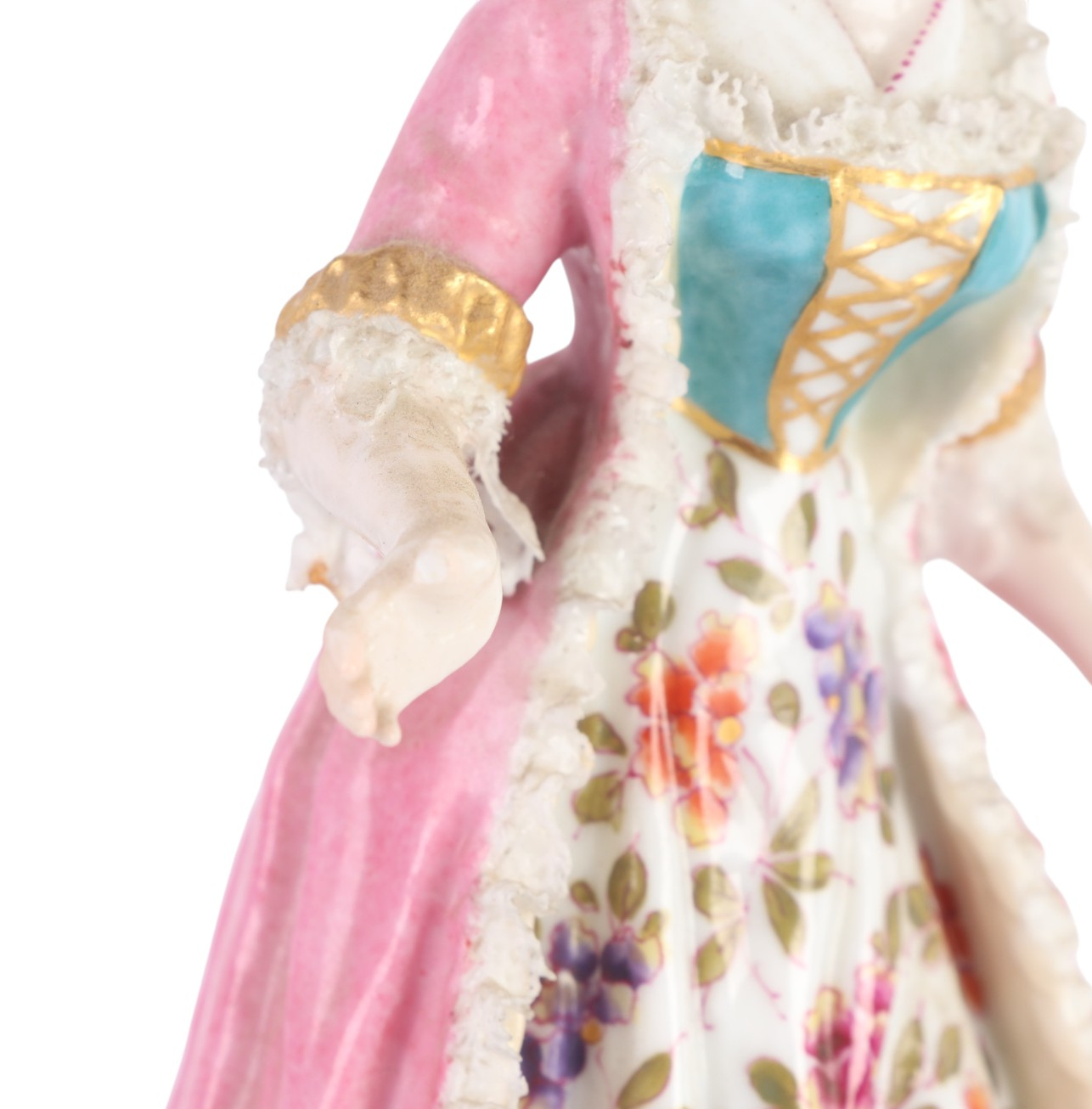 A pair of Meissen porcelain figures depicting a gentleman and lady in ...