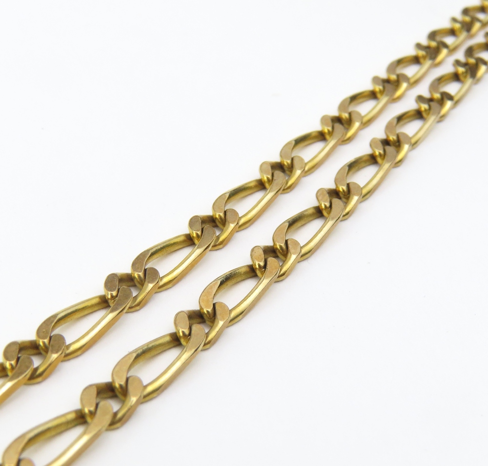 A 9ct gold, Figaro link chain, the links filed and polished, with a ...