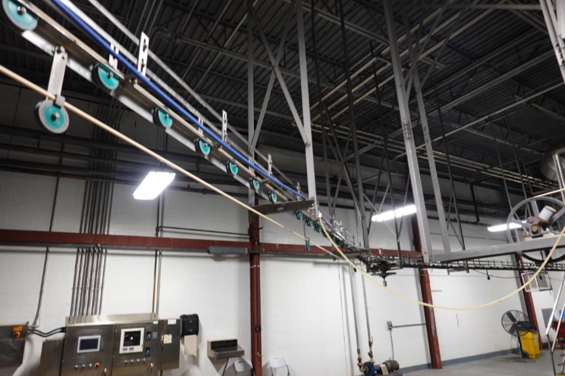 SS overhead can trolley, band conveyor, approximately 150 ft **{3rd ...