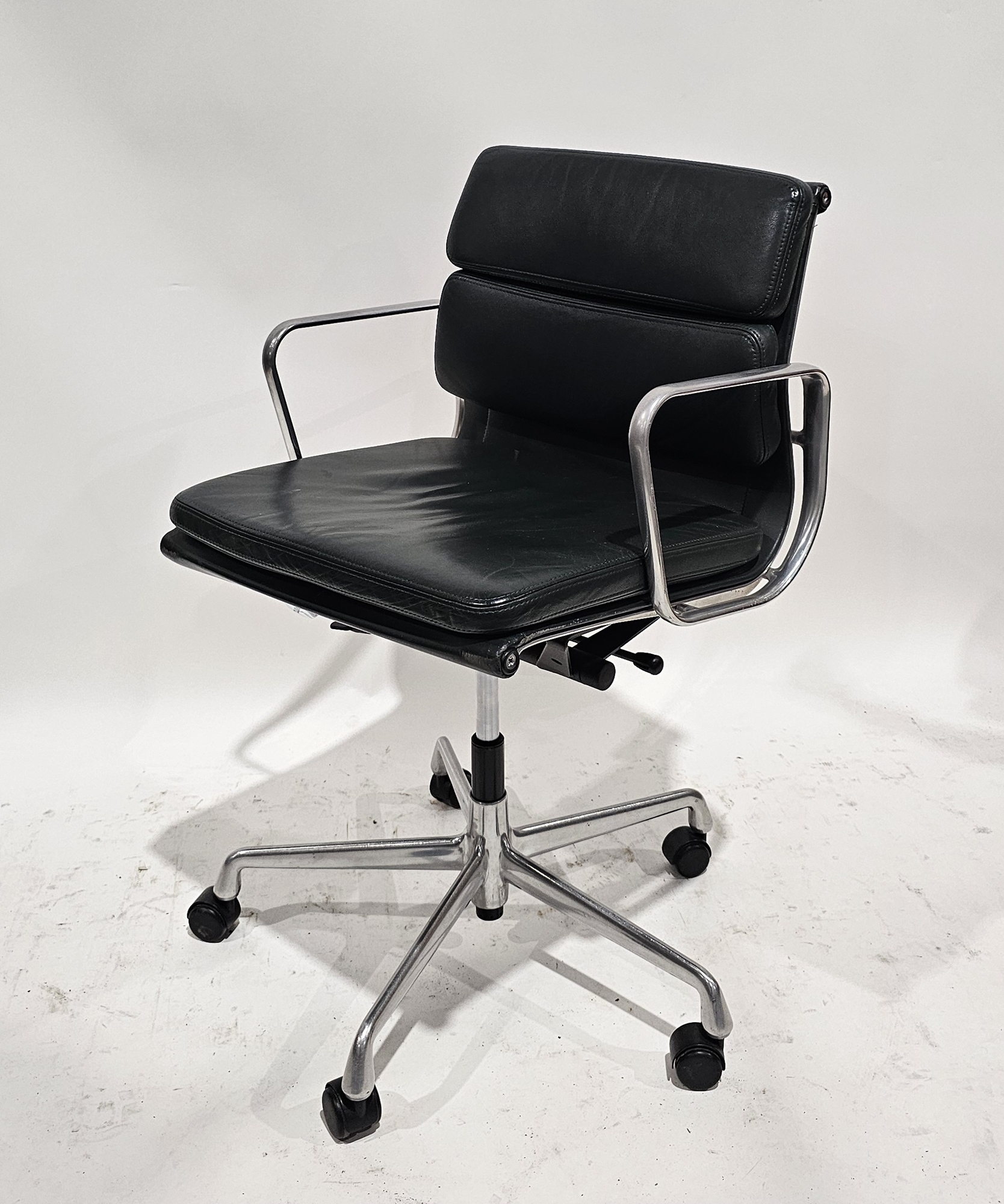 After Charles and Ray Eames, an EA (208) swivel elbow chair ...