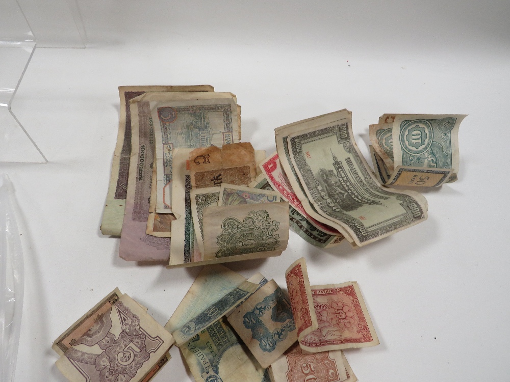 A collection of vintage foreign bank notes