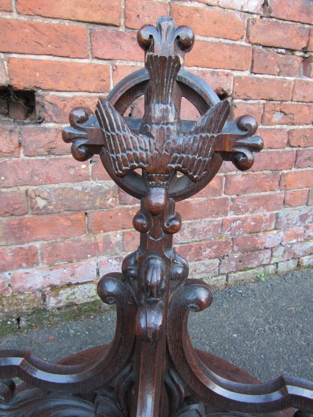 A GOTHIC OAK CARVED CHURCH FONT COVER, having four pierced carved ...