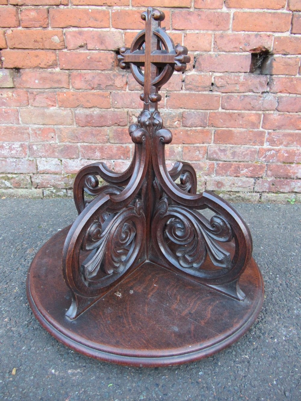 A GOTHIC OAK CARVED CHURCH FONT COVER, having four pierced carved ...