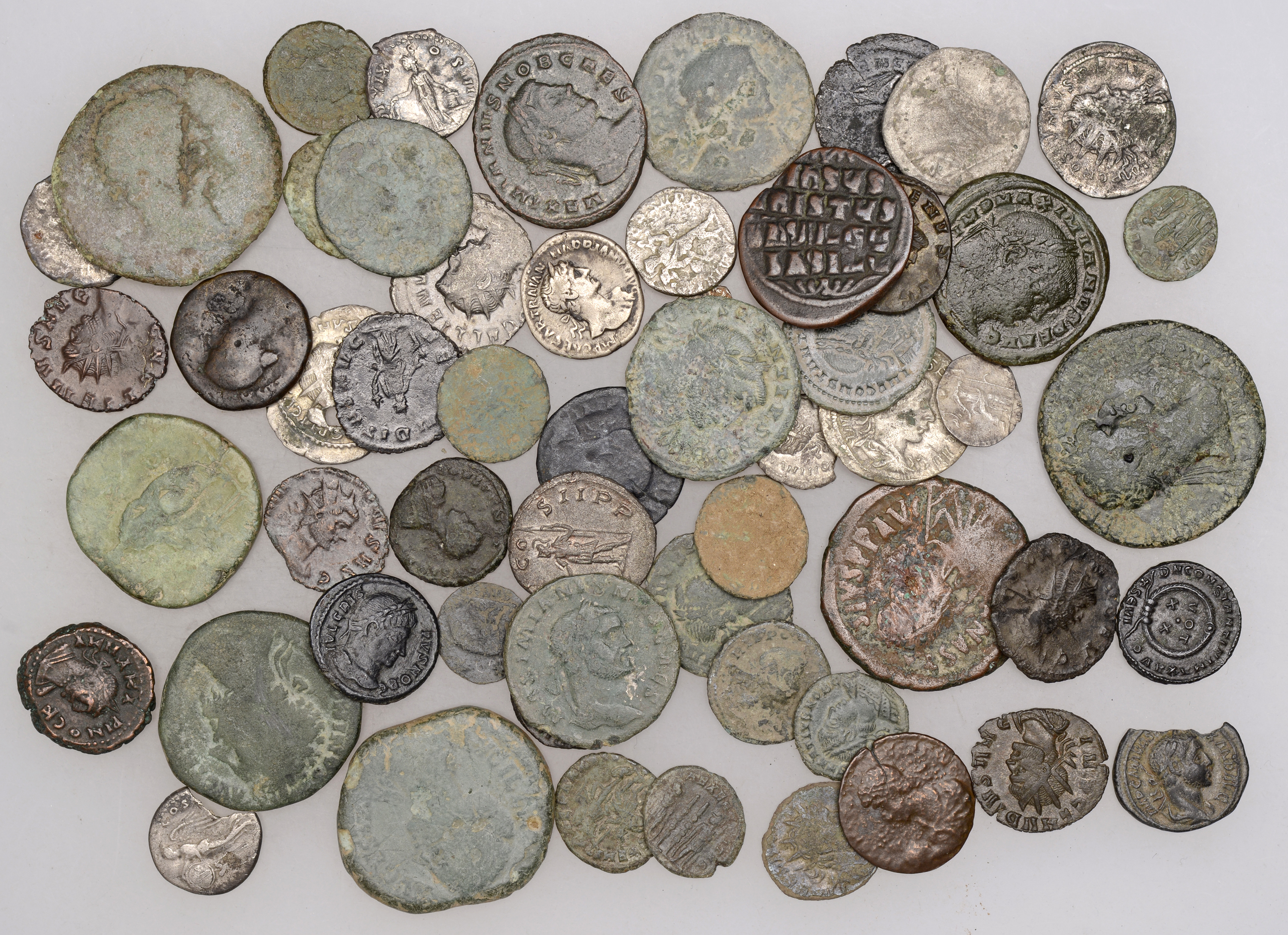 Miscellaneous Roman coins in silver (10) and base metal (46), various ...