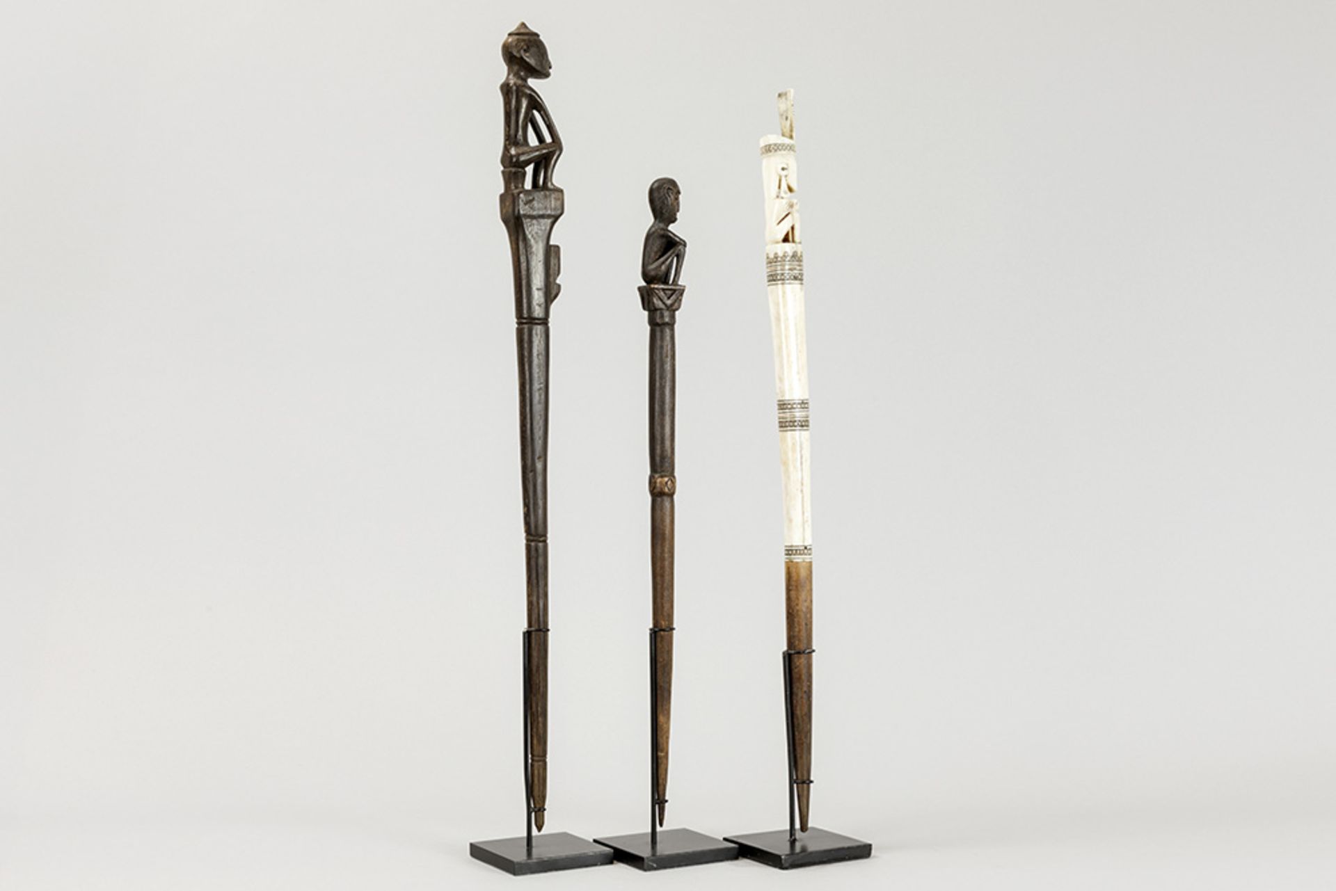 three "Tuntun" measure sticks/talismans : two in wood from the Dayak ...