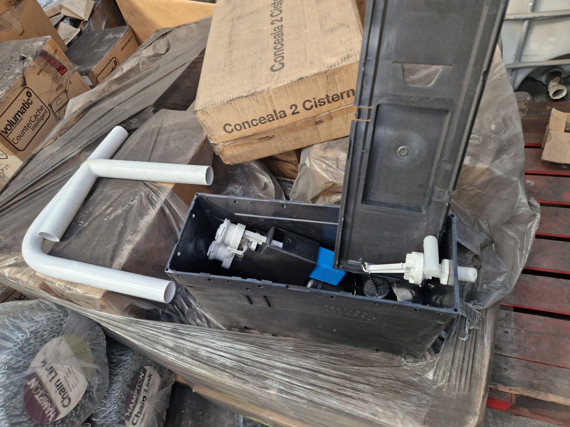 Half of pallet of cisterns new in boxes with pipes ect approx 20 on ...