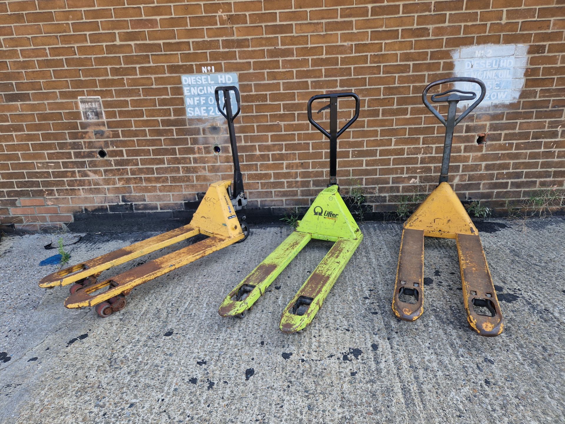 3x pump trucks pallet trucks 2 working order goes up down as should one ...