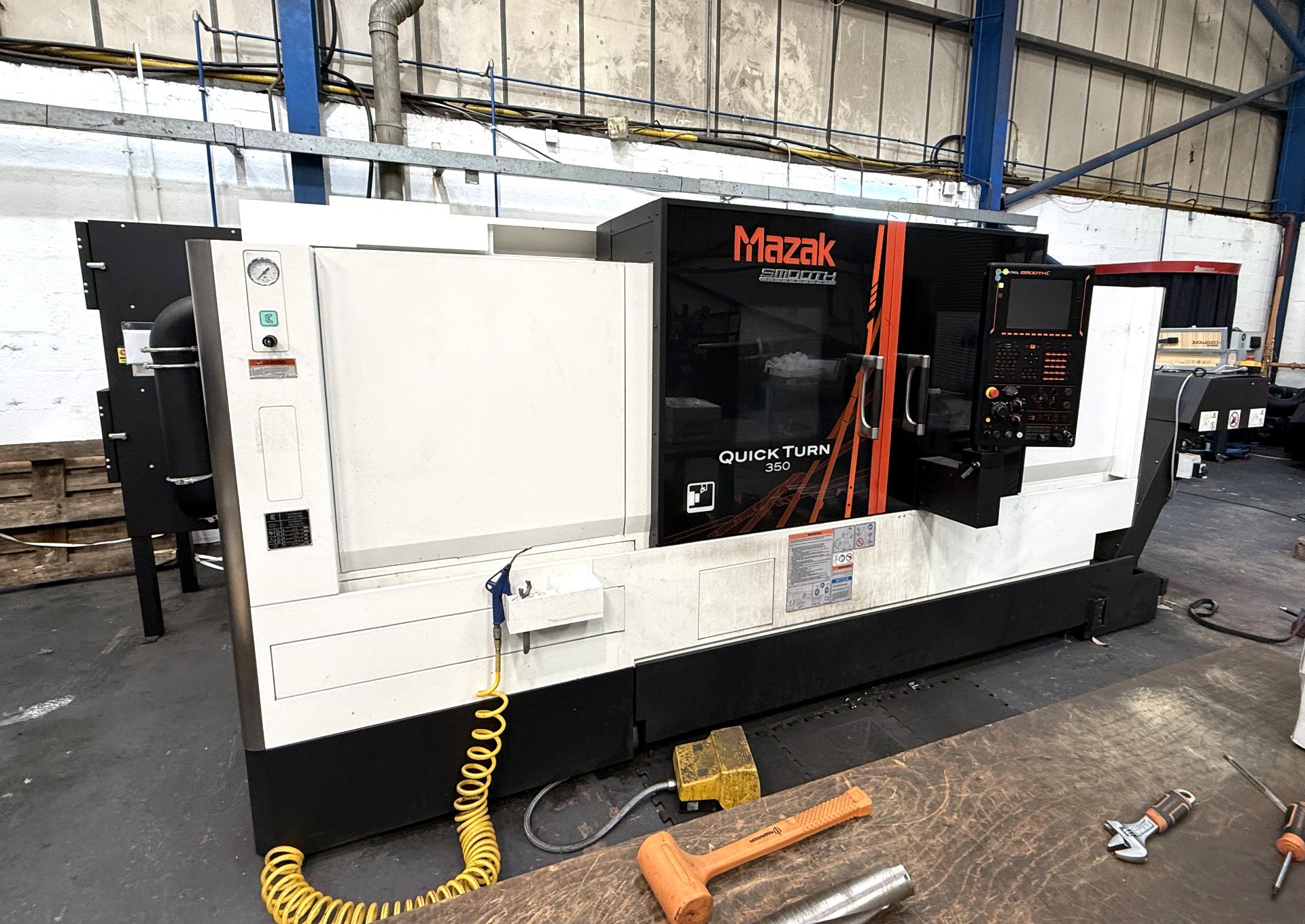The 2024 Mazak Quick Turn 350 is a powerful and versatile CNC lathe ...